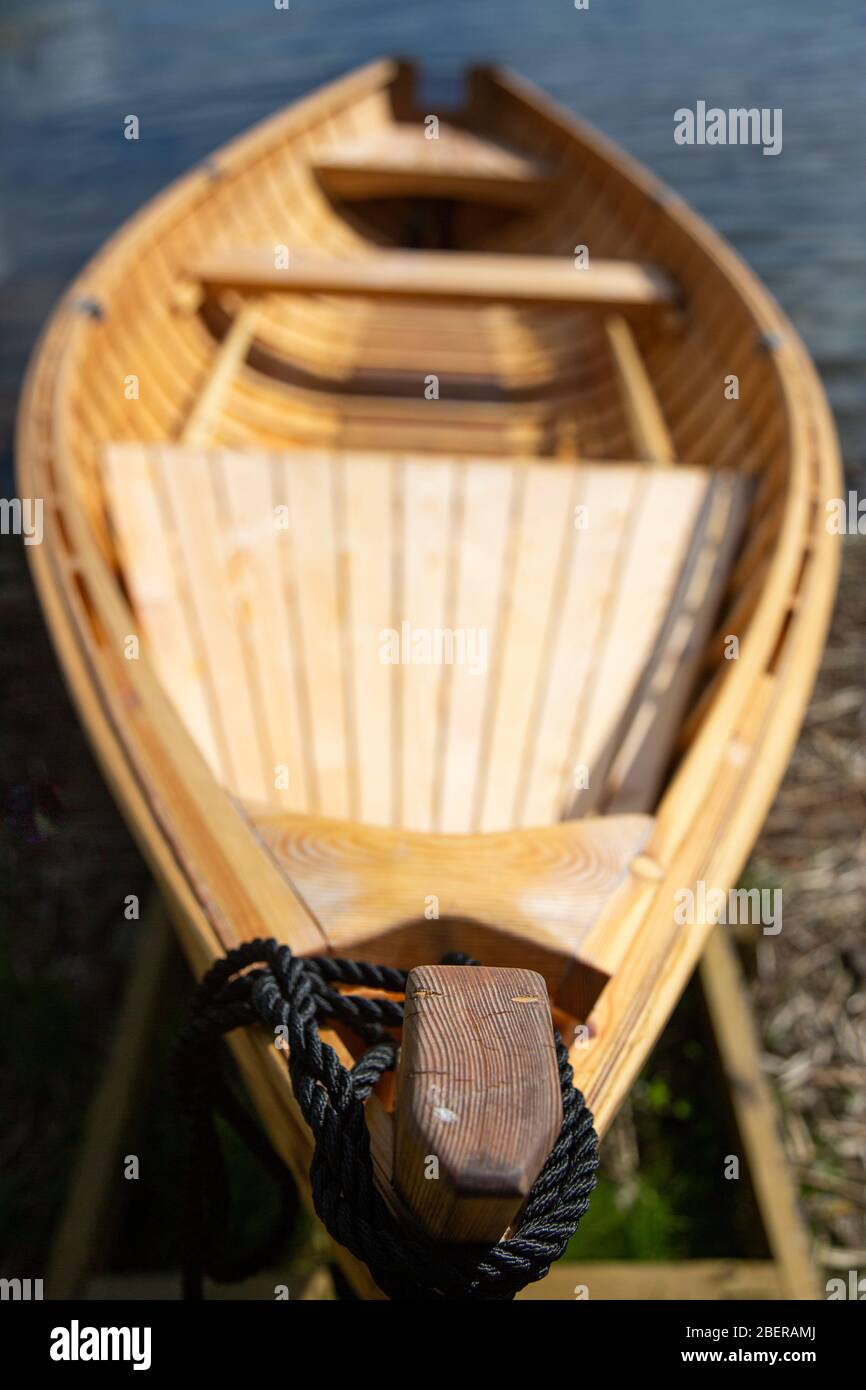 Blurred hull shape of a wooden rowboat / skiff Stock Photo - Alamy