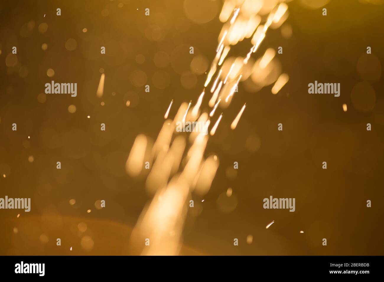 Abstract orange lights like sparkles of fire Stock Photo - Alamy