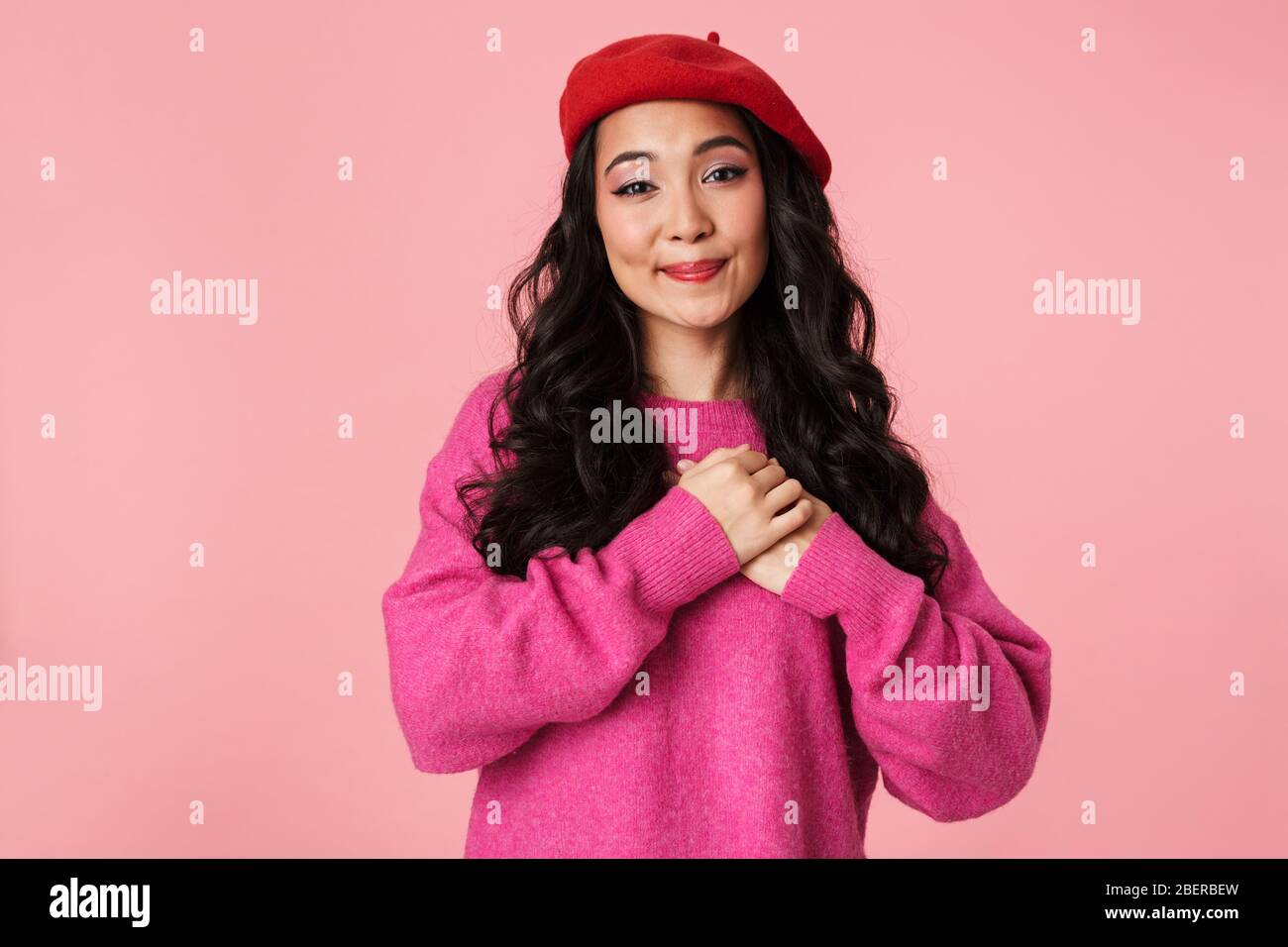 Image of young beautiful asian girl wearing beret smiling and holding ...
