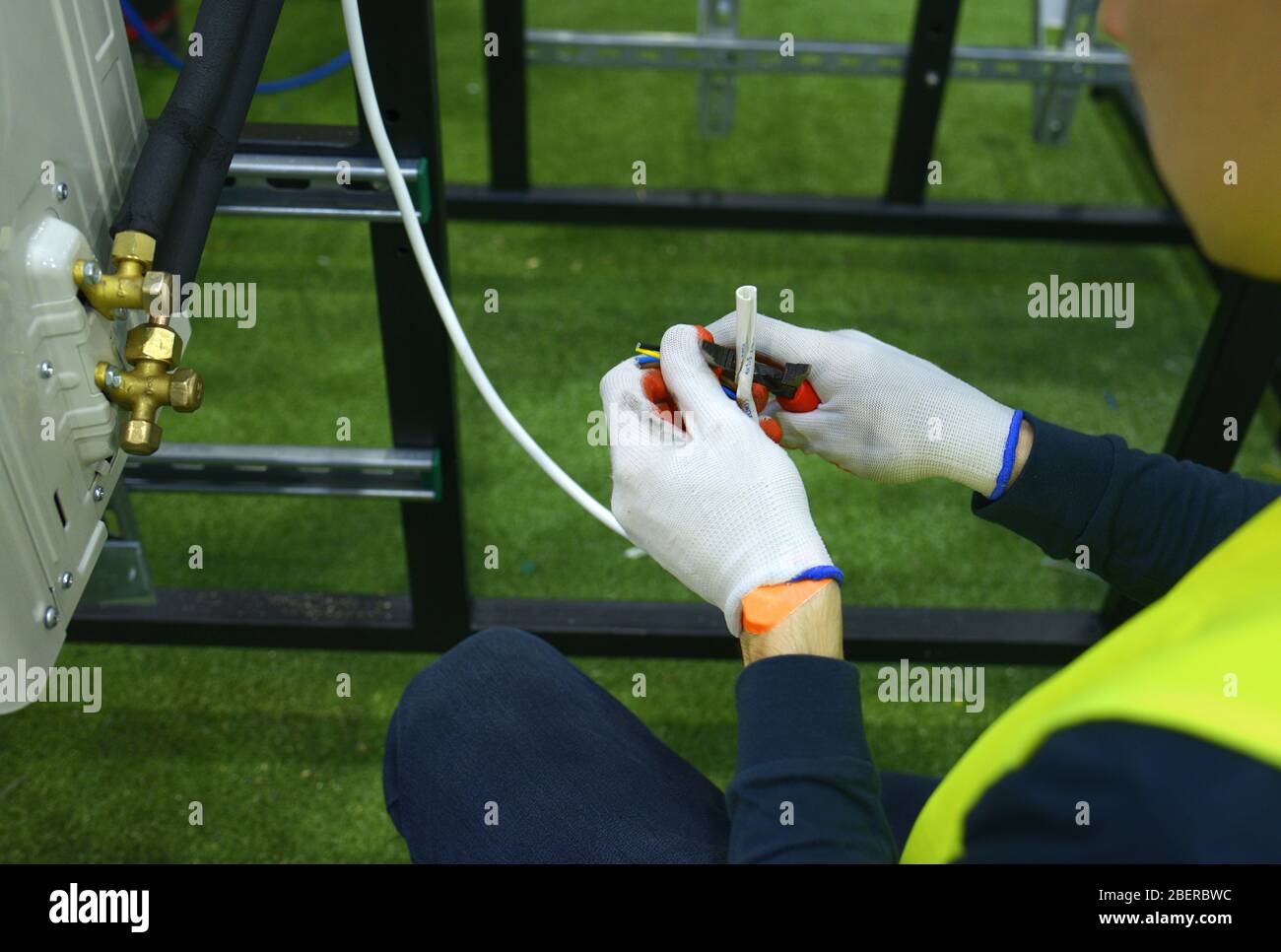 Using pliers hi-res stock photography and images - Alamy