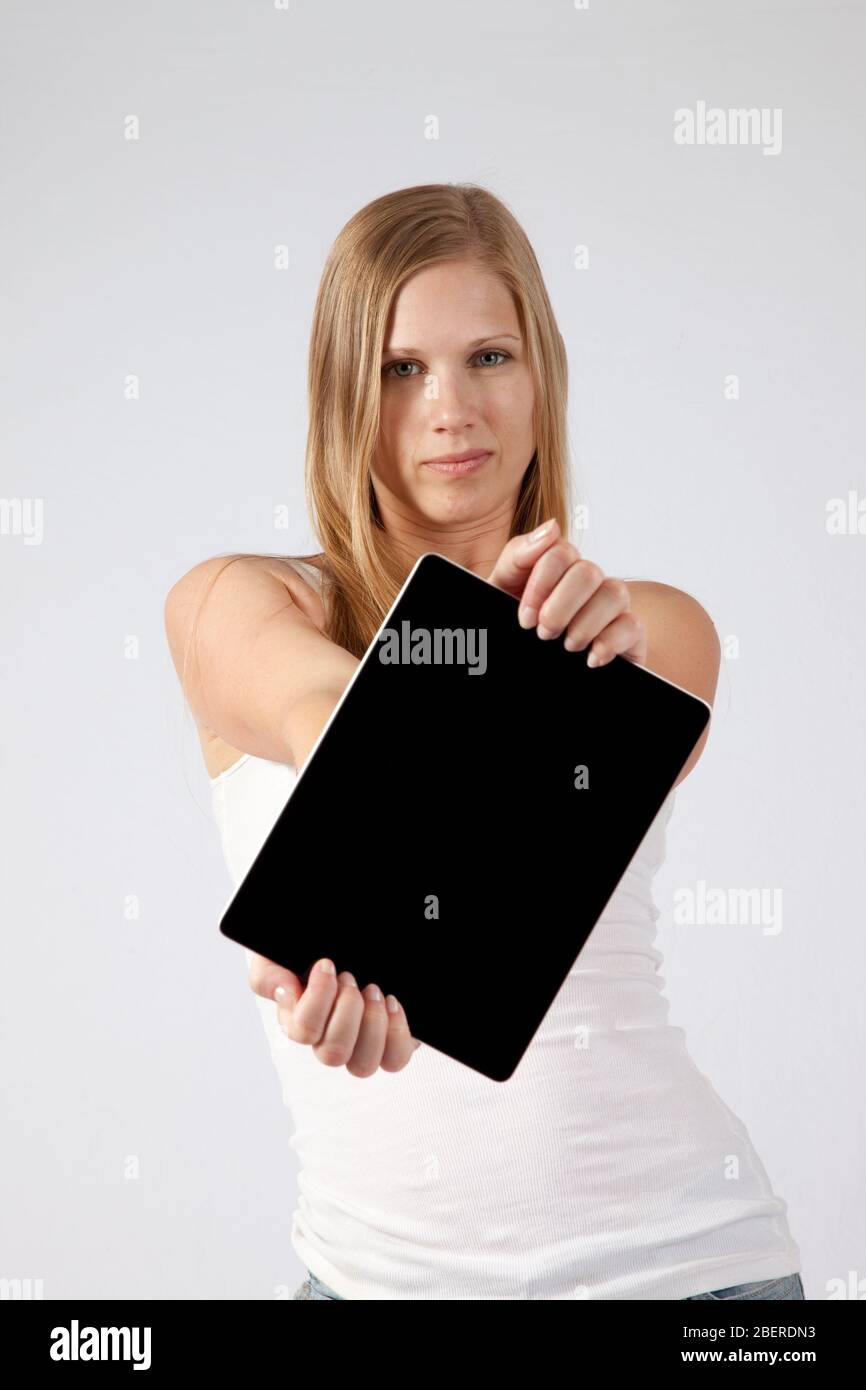 Pretty Blond holdinga blank sign for your message Stock Photo - Alamy