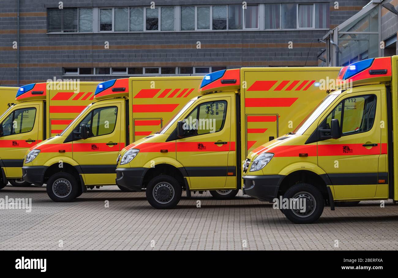 Dresden, Germany. 14th Apr, 2020. Ambulances stand in the yard of a ...