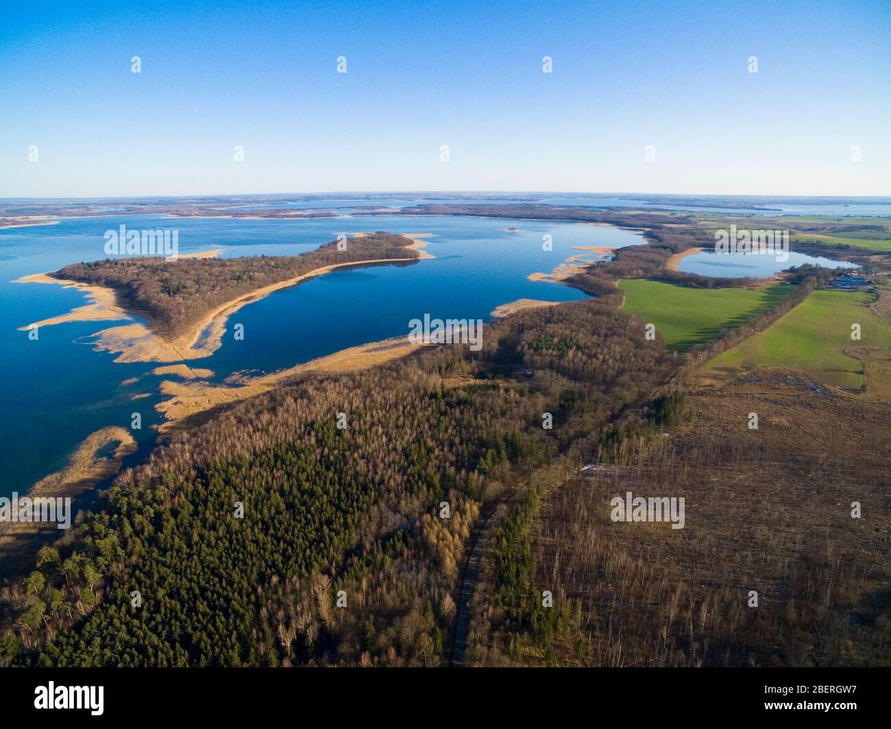 Aerial view of Upalty island on Mamry Lake, Mazury, Poland. Upalty is ...