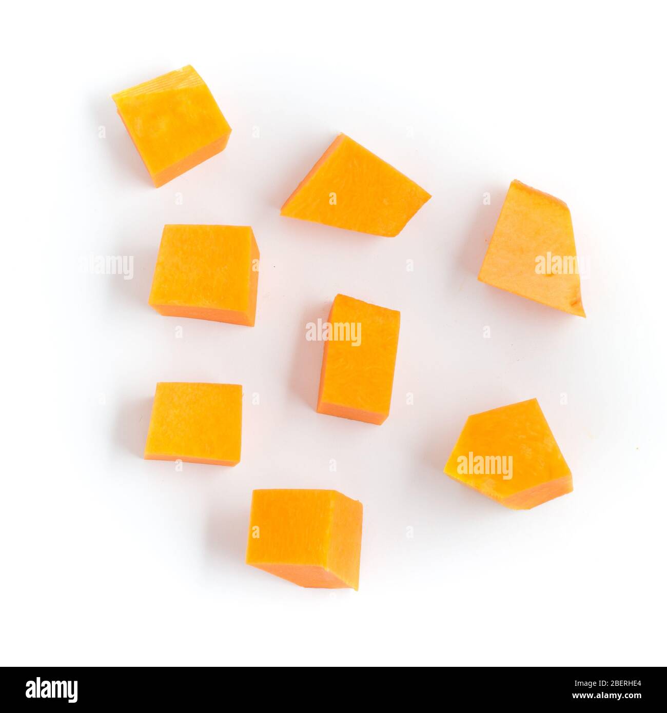Diced Pumpkin in a bowl isolated on white background Stock Photo - Alamy