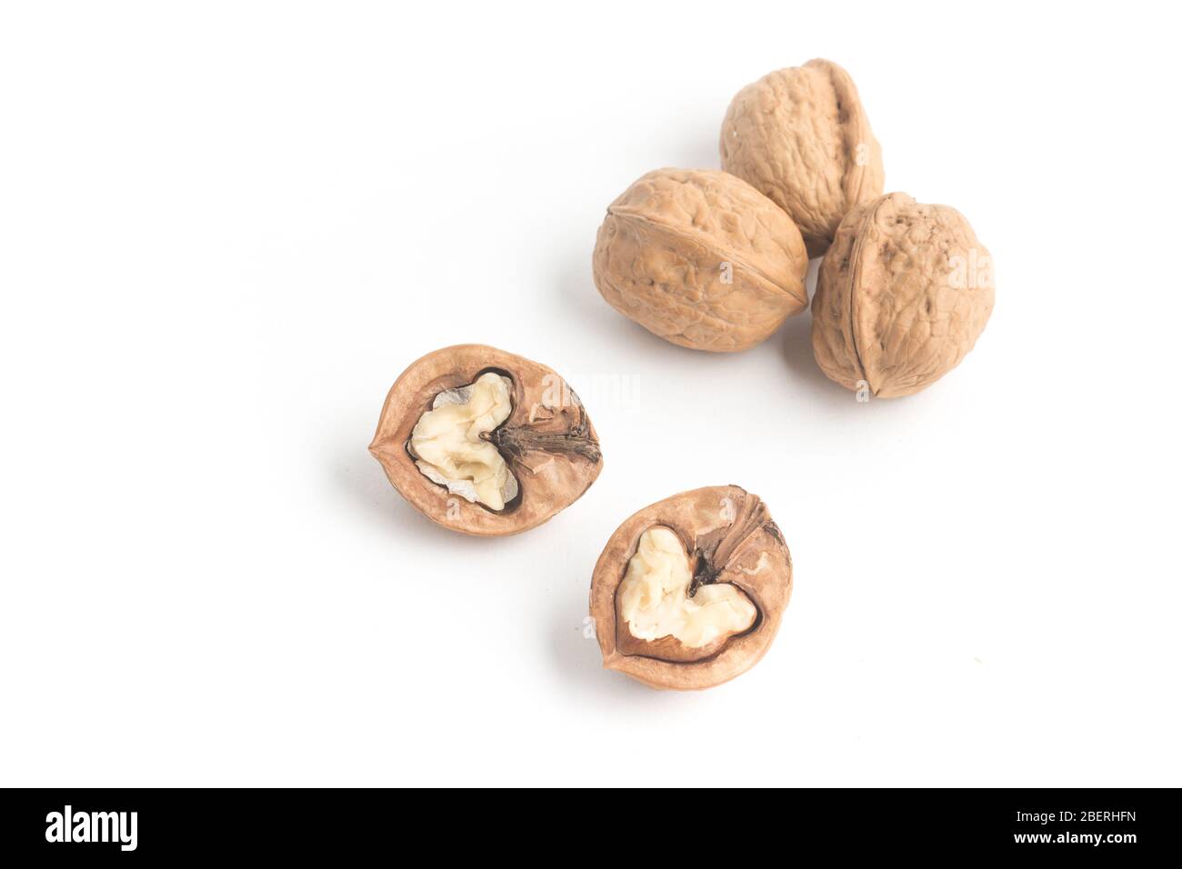 Walnuts heart shaped isolated in white background Stock Photo - Alamy