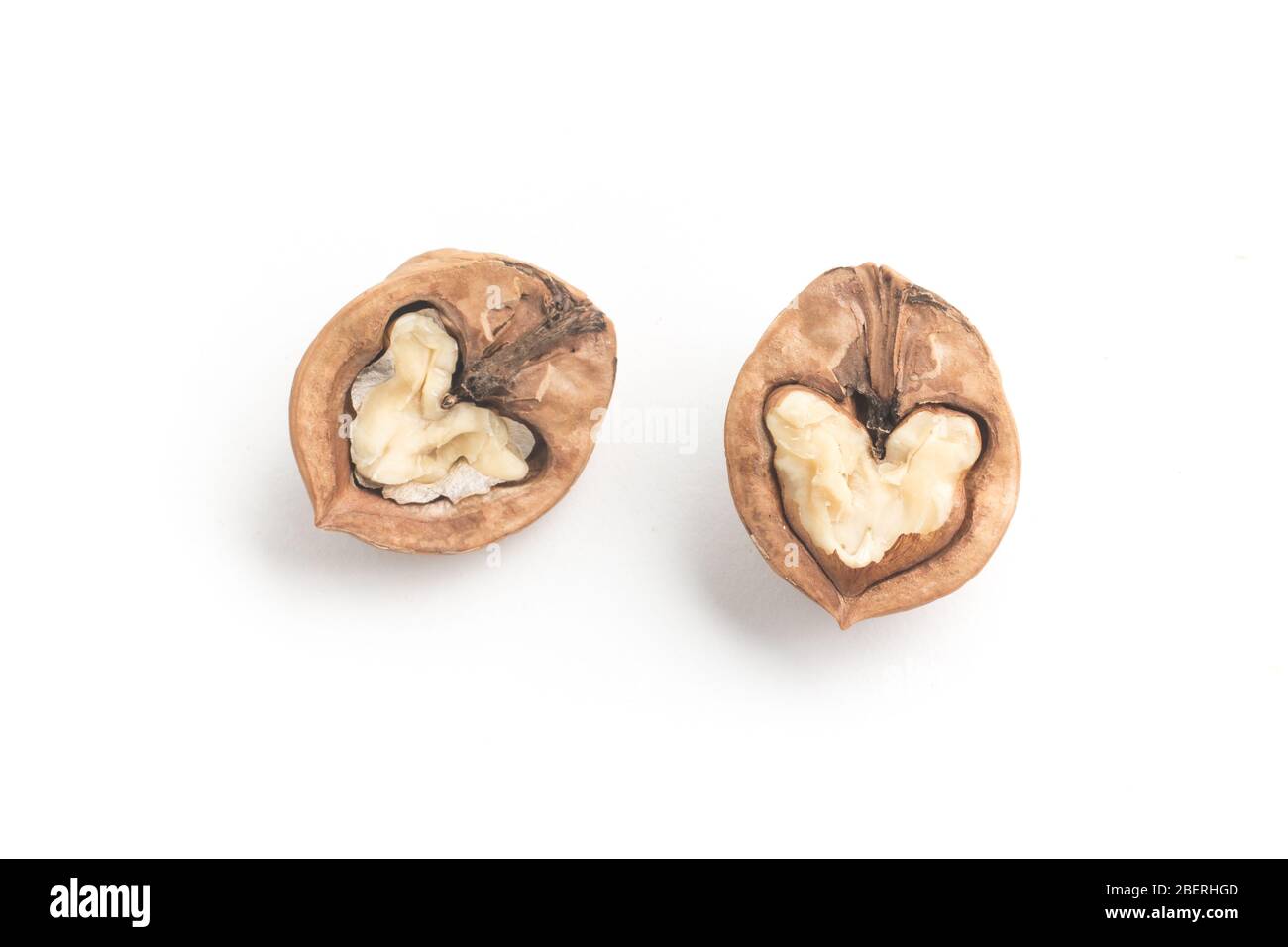 Walnuts heart shaped isolated in white background Stock Photo - Alamy