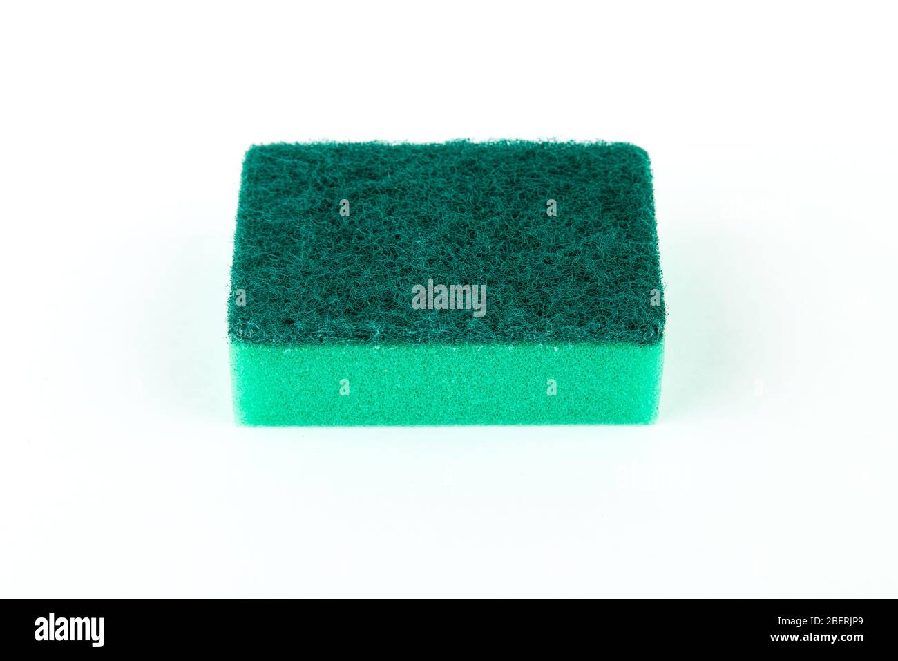 Sponge for wash utensil. isolated on white Stock Photo - Alamy