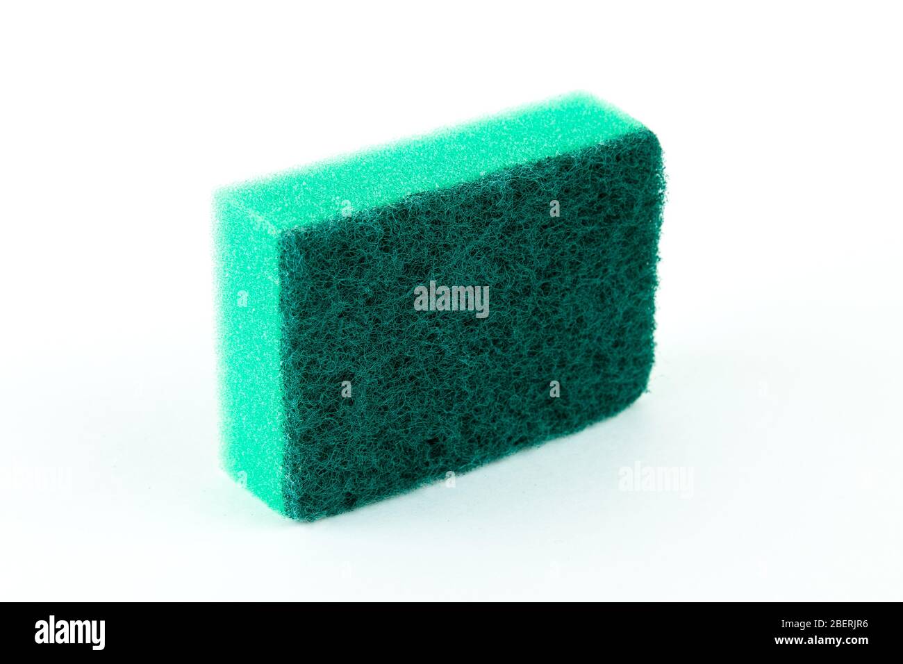 Sponge for wash utensil. isolated on white Stock Photo - Alamy
