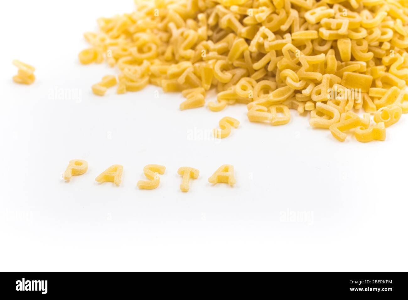Pile of Letter-shaped pasta isolated on white background Stock Photo ...