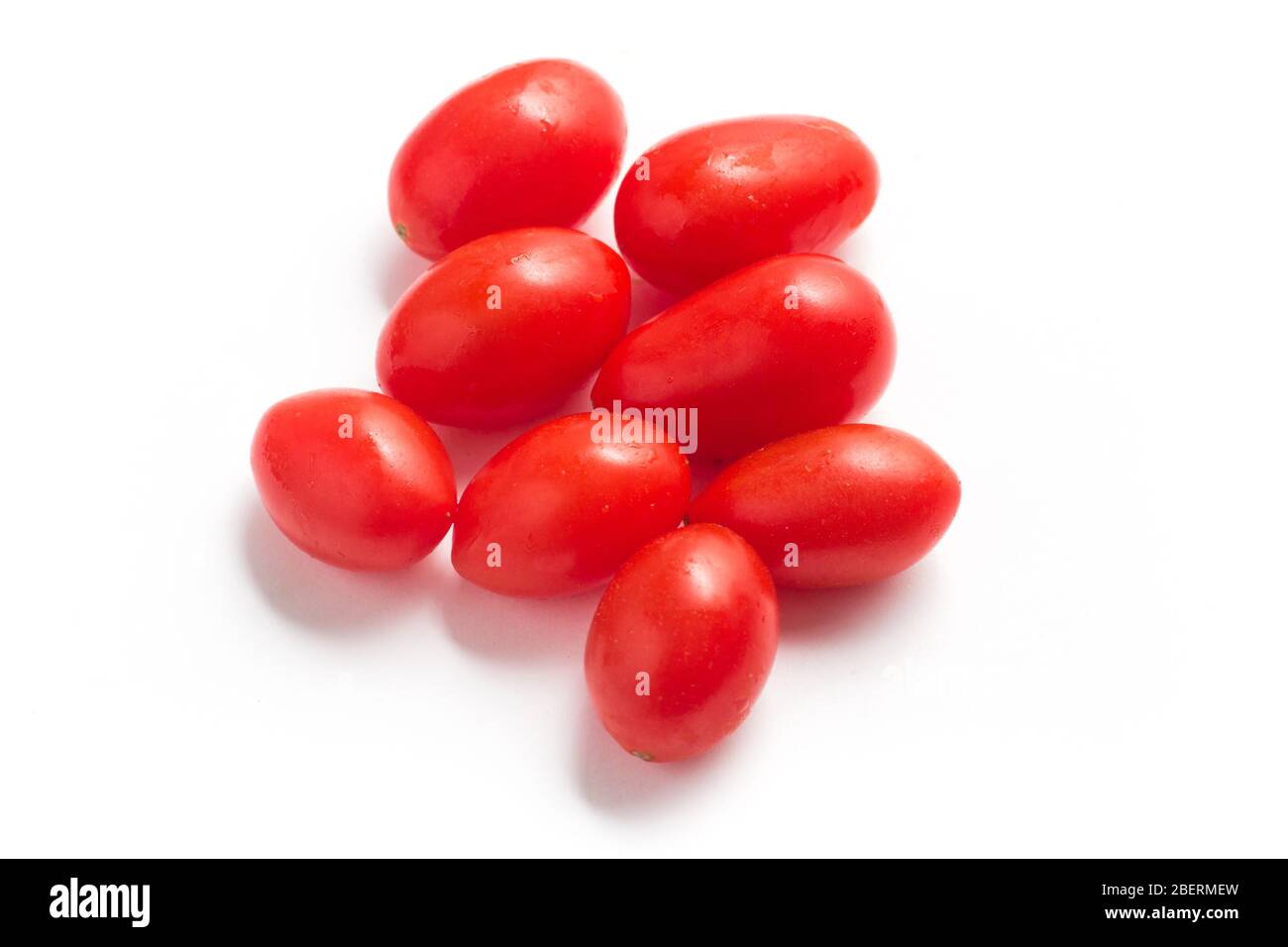 Cherry Tomatoes. Close-up photo isolated in white background Stock ...