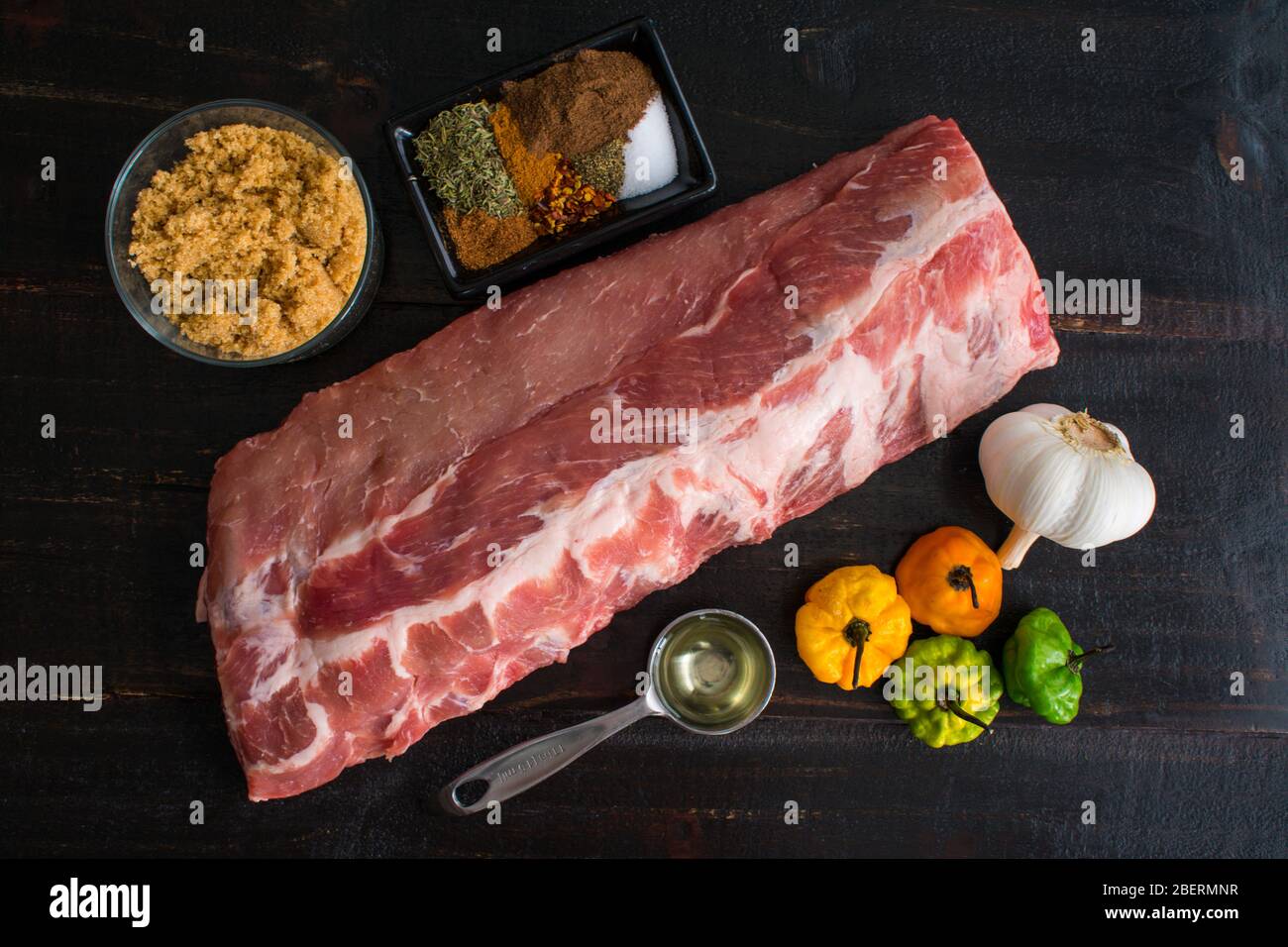 Jamaican Jerk Pork Ribs Ingredients: A rack of baby back ribs, brown ...