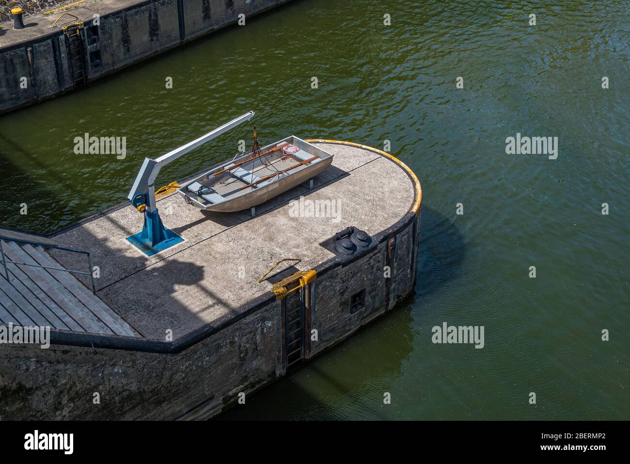Lifeboat with a crane at a small harbor in Germany Stock Photo - Alamy