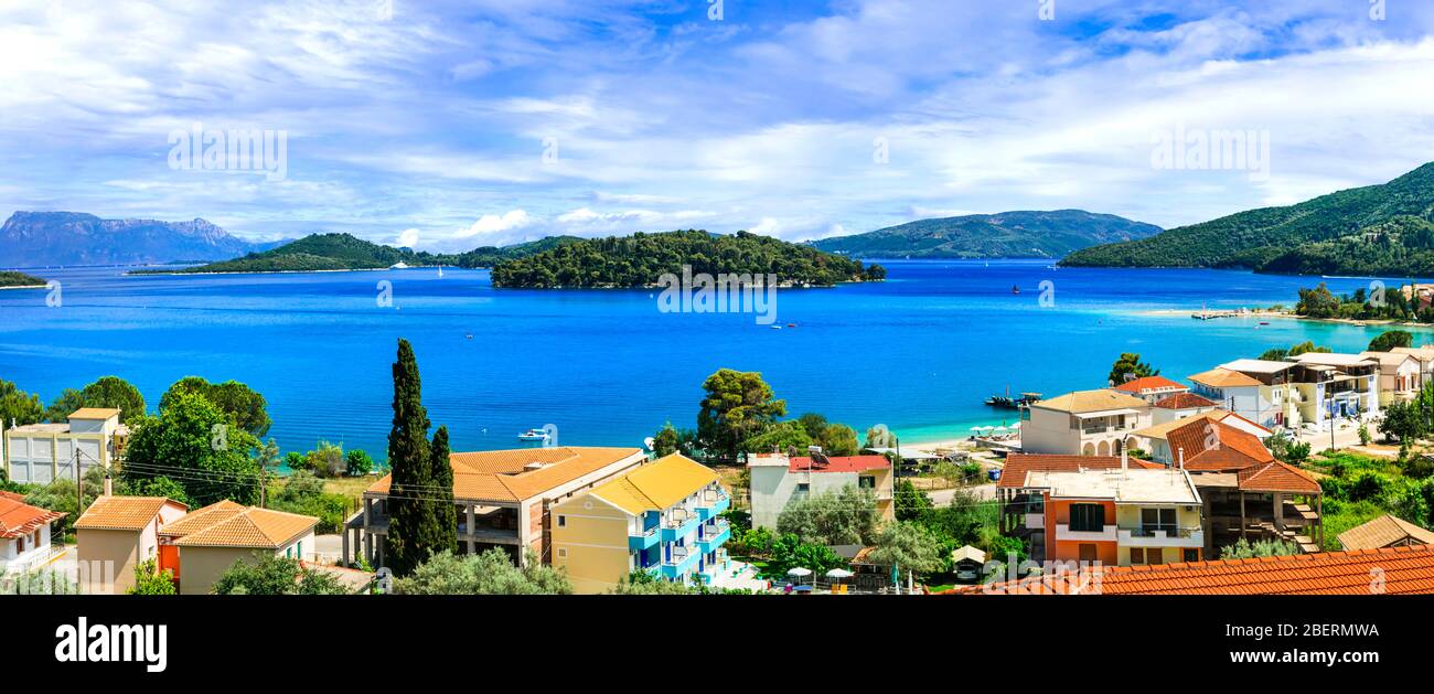 Beautiful Nydri Bay,view with colorful houses,sea and mountains,Lefkada ...