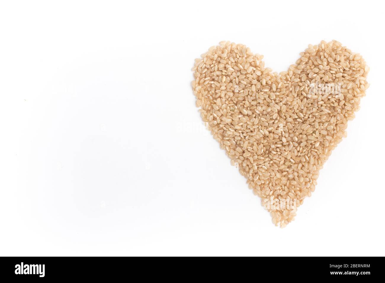 Cateto Whole grain Rice heart shaped isolated on white background Stock ...