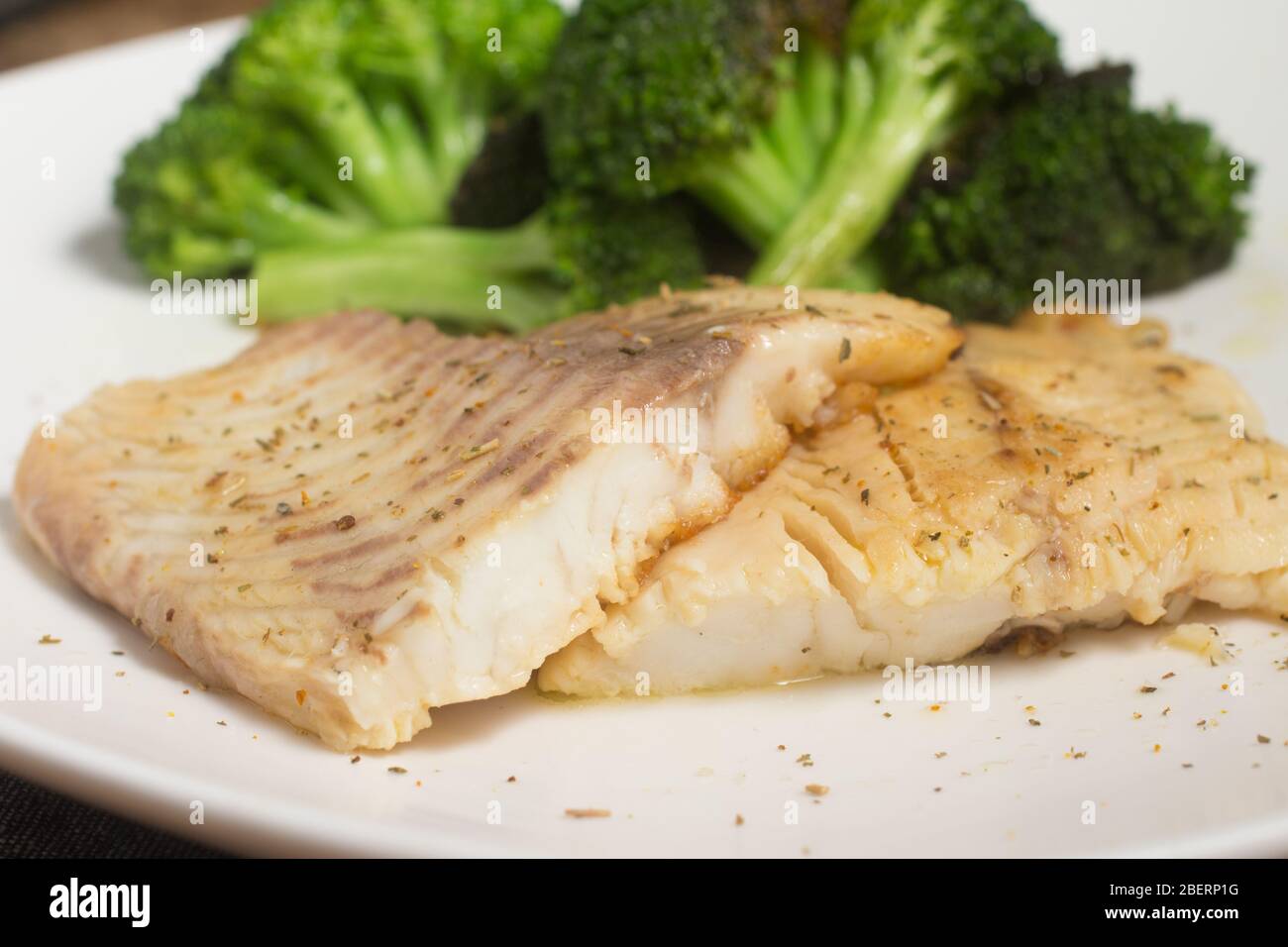 Fish Fillet of Tilapia Fried with broccoli Stock Photo - Alamy