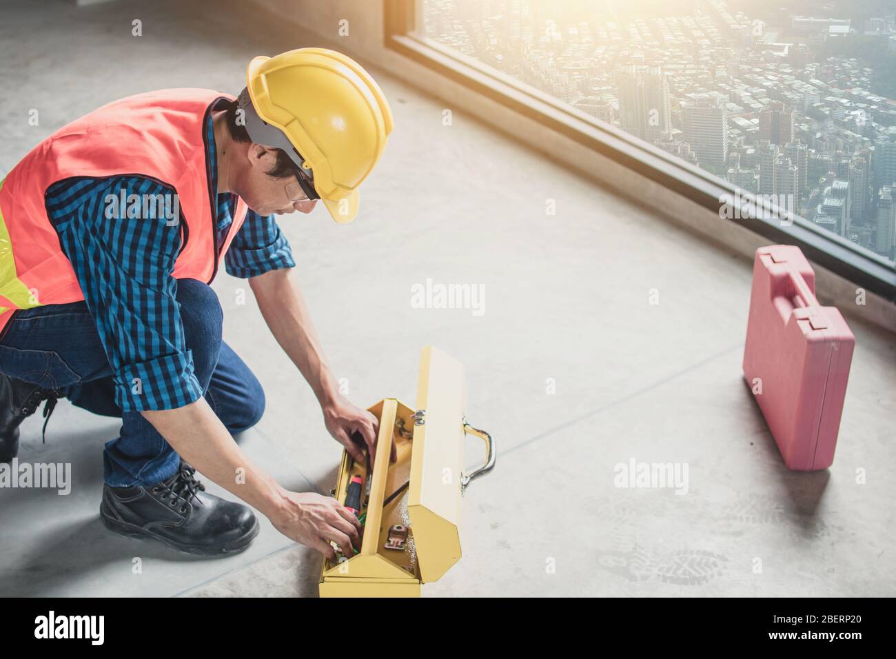 working man prepare and find tool in box Stock Photo - Alamy
