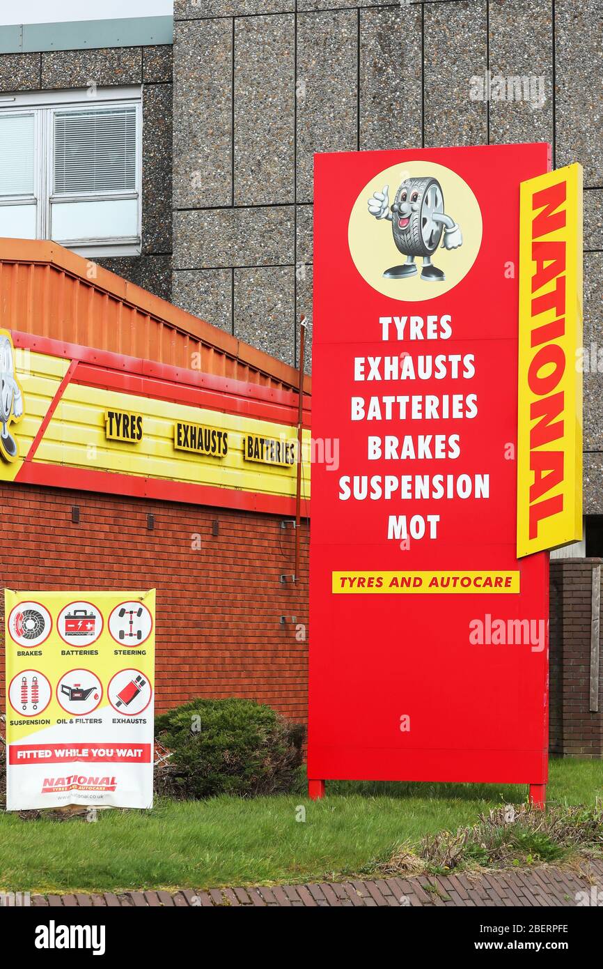 Logo and signage for the National tyre company Stock Photo - Alamy