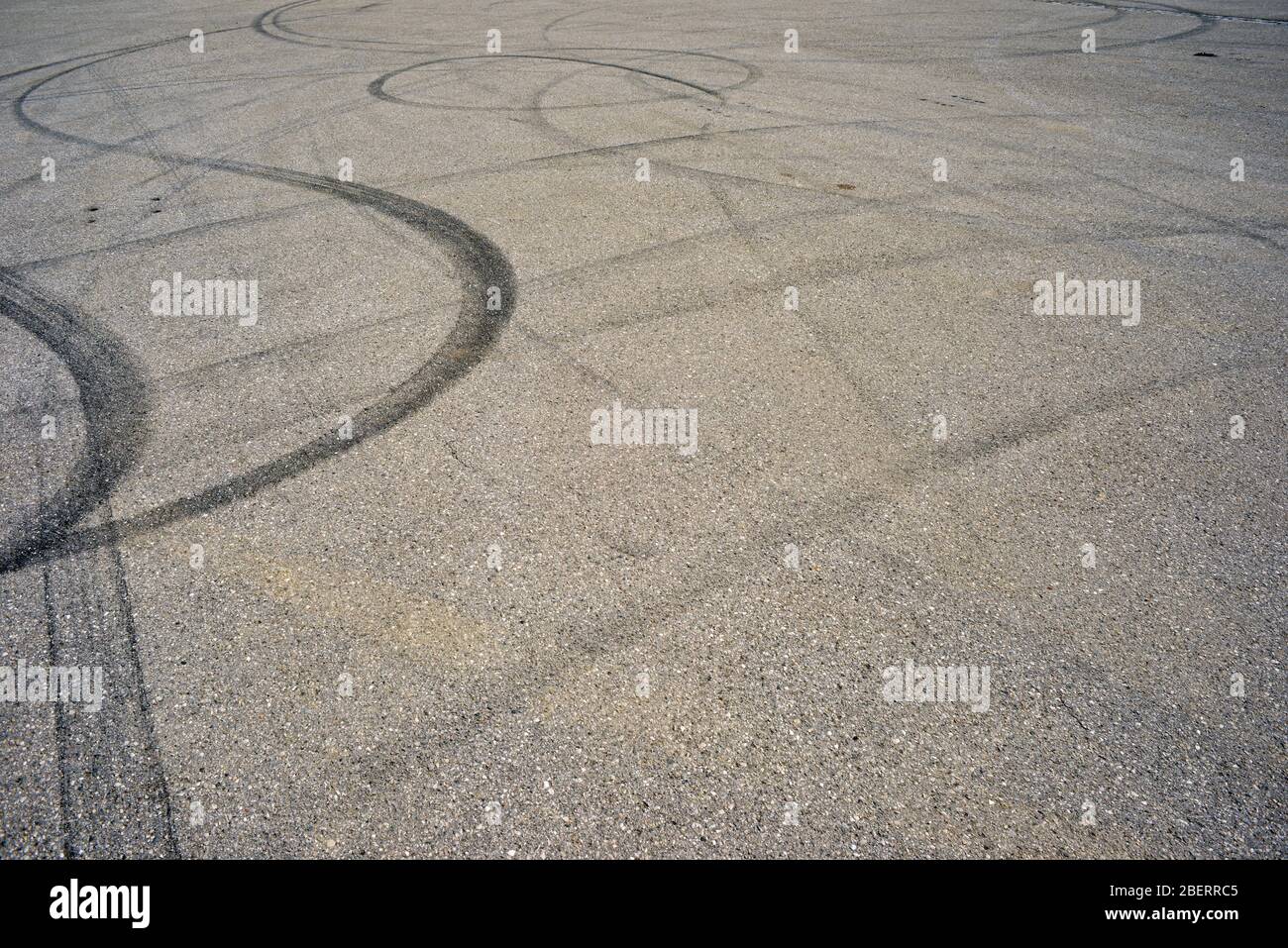 Car wheel traces on asphalt Stock Photo - Alamy