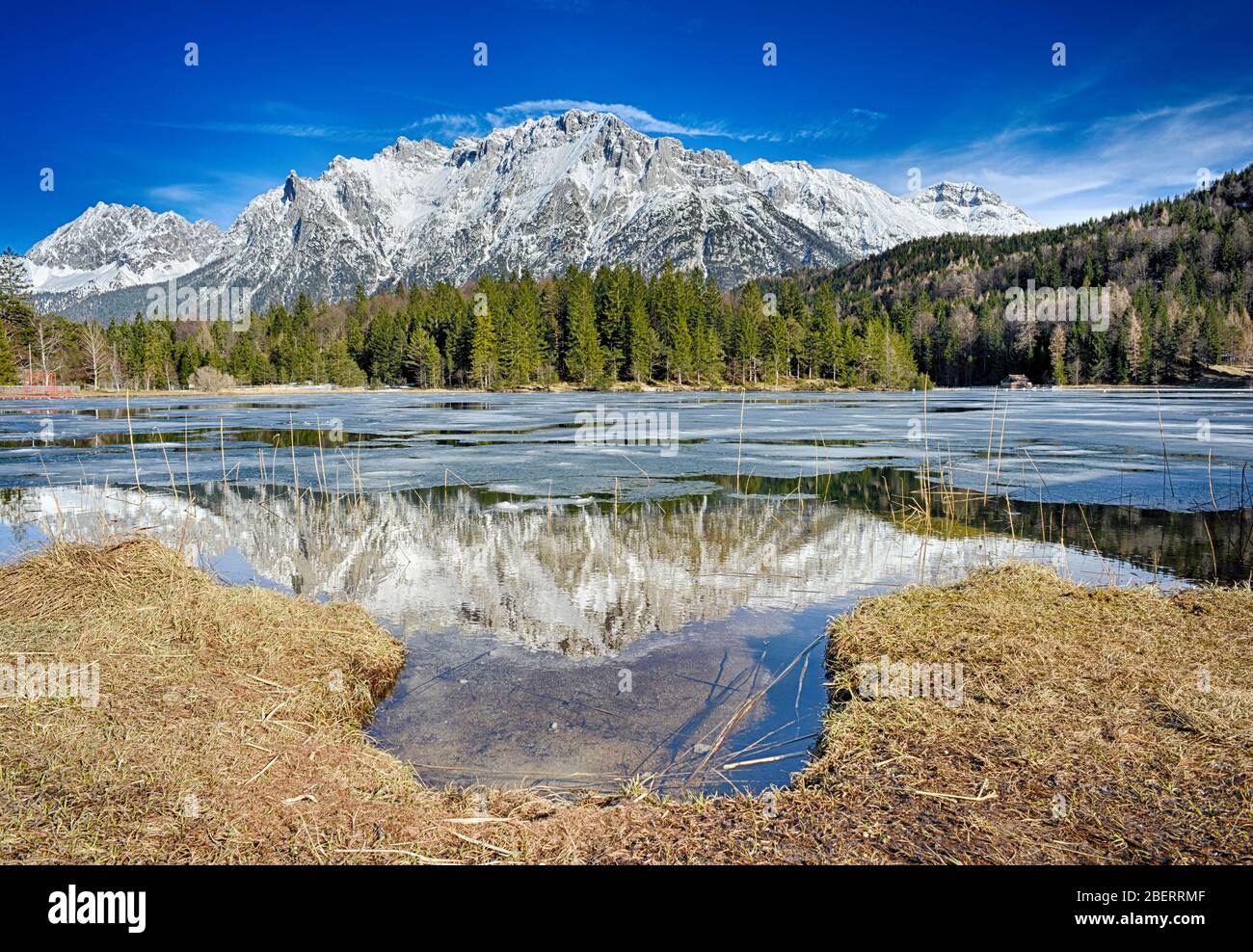 Lautersee Lake covered with ice, near Mittenwald Germany with view on ...