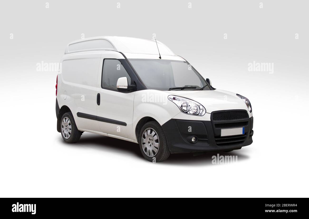 White small van side view isolated on white Stock Photo - Alamy