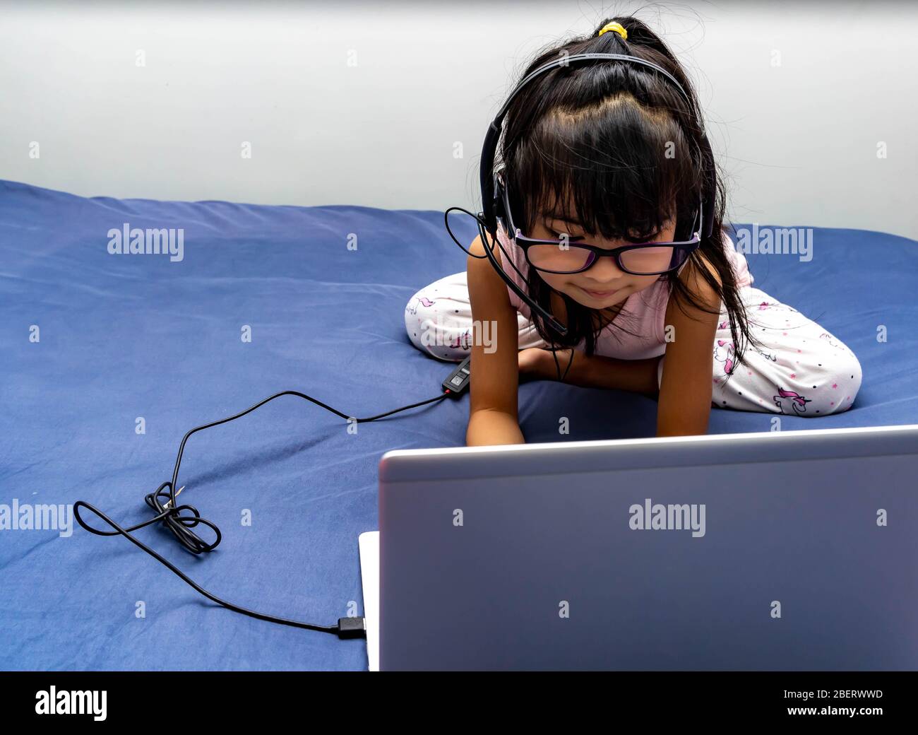 Pretty female child pretending like working from home. Child pretending ...