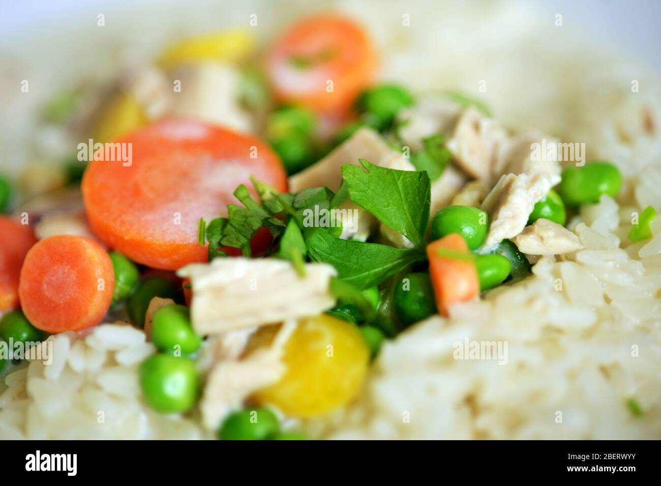 Chicken rice and vegetables close up Stock Photo - Alamy