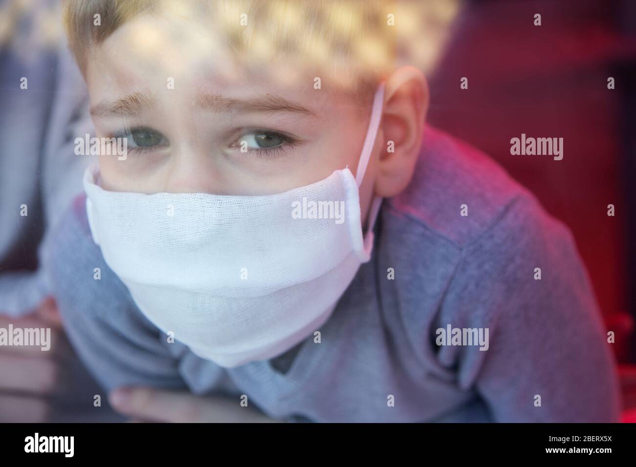 Sad boy in protective medical hi-res stock photography and images - Alamy