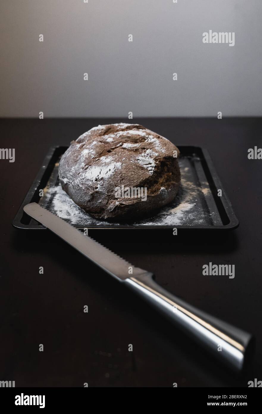 Fresh Home baked bread, rustic loaf flour, knife, tray wooden board ...