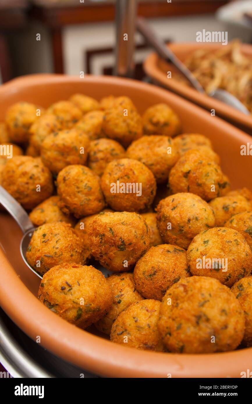 Traditional portuguese cod cake appetizer with herbs Stock Photo - Alamy