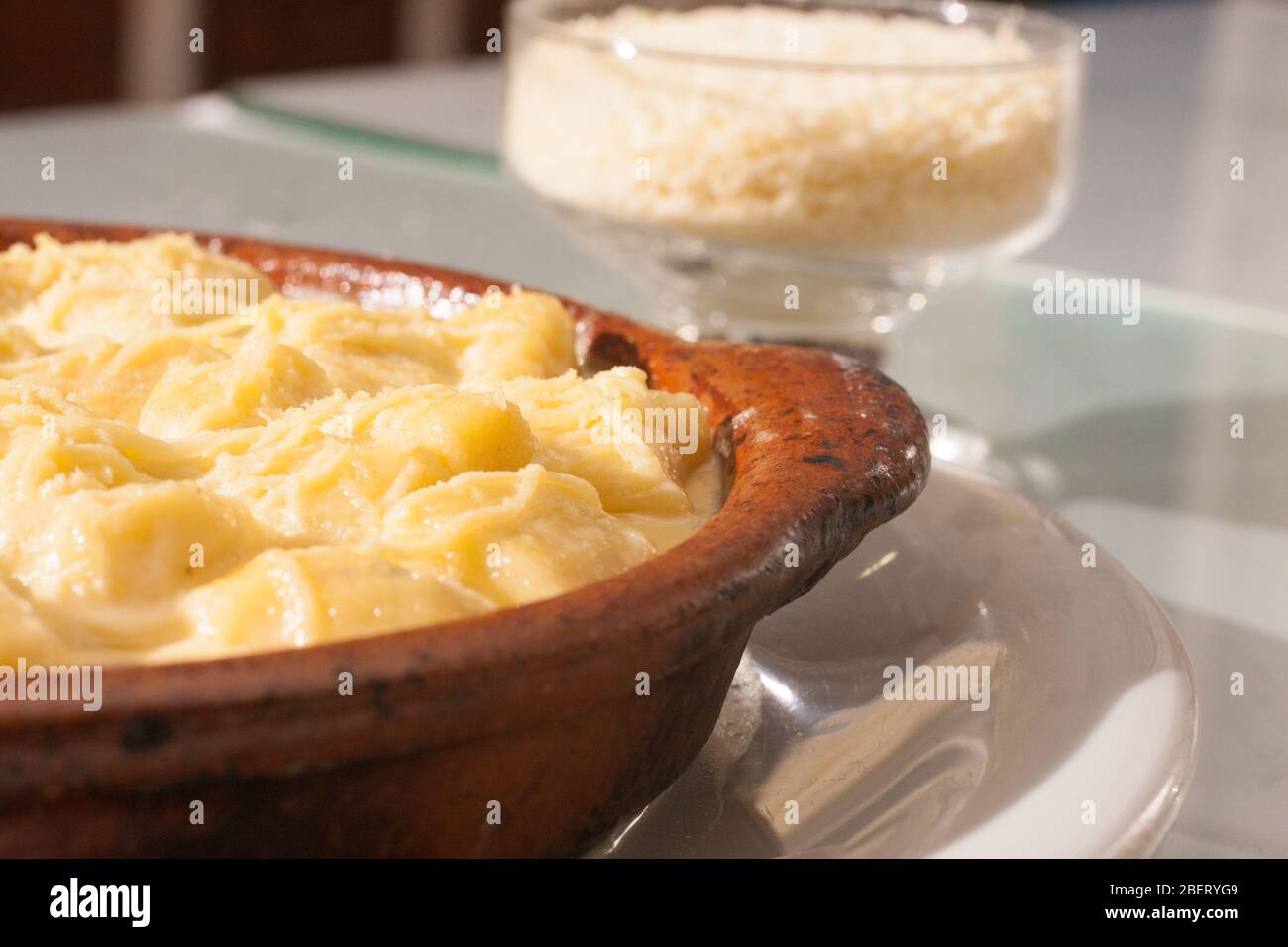 Traditional Italian Gnocchi with grana padano cheese Stock Photo - Alamy Traditional Italian Gnocchi with grana padano cheese Stock Photo - Alamy