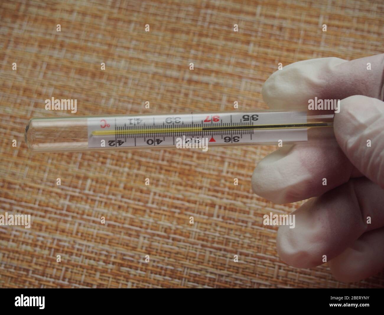 A slight increase in temperature on the thermometer. 37.5 degrees ...