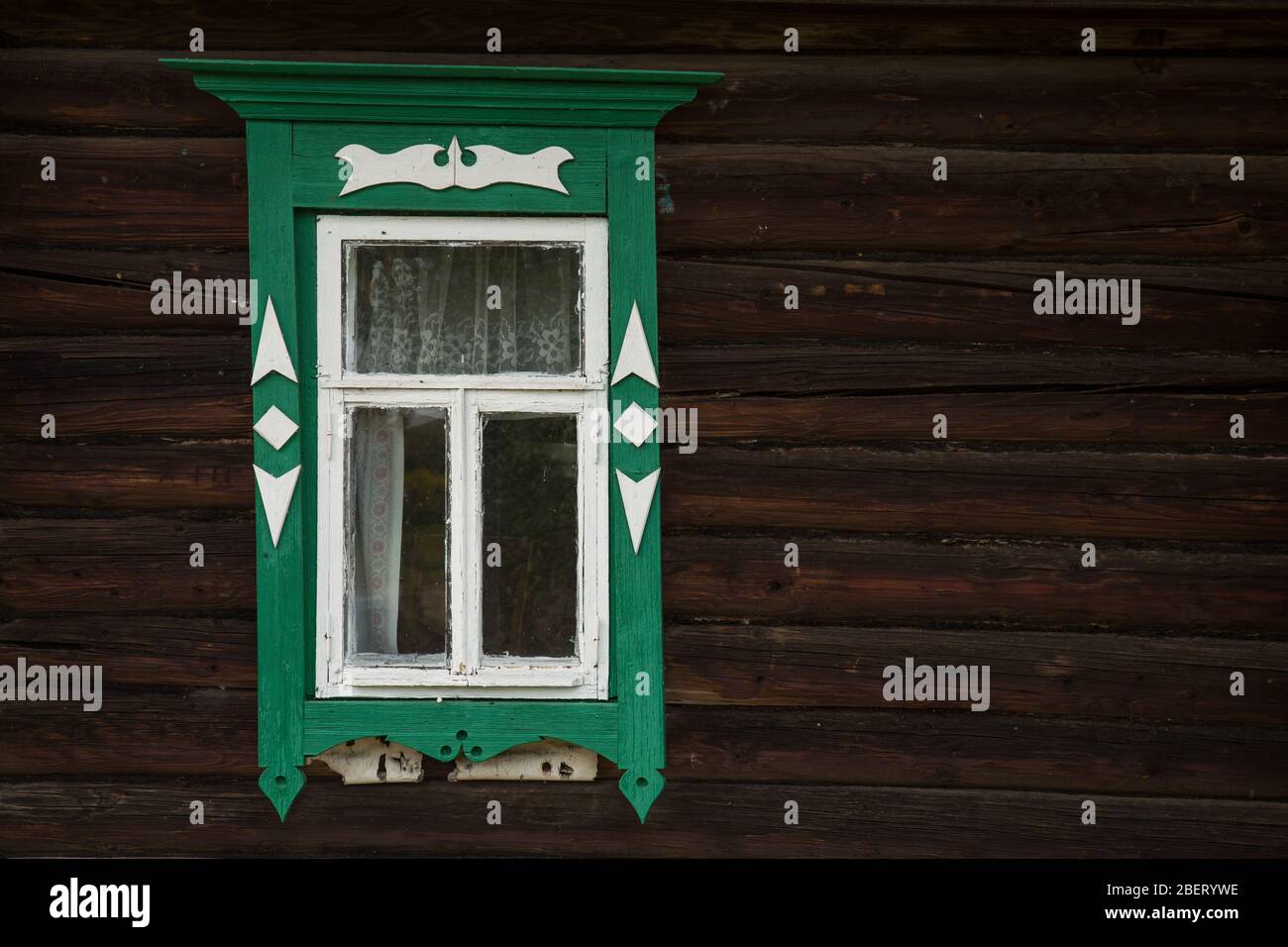 Window with beautiful fretted wooden case . It's a traditional ...
