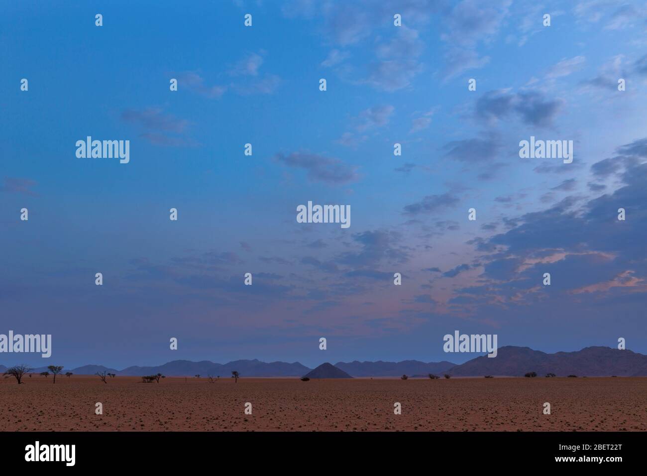 Wide open dry plains and mountains Stock Photo - Alamy