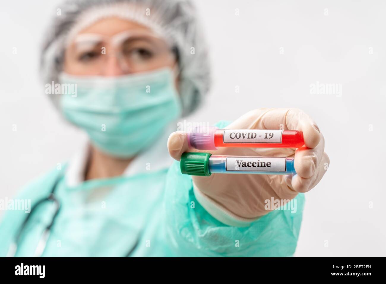 Doctor nurse in a hospital laboratory clinic showing test tubes with ...