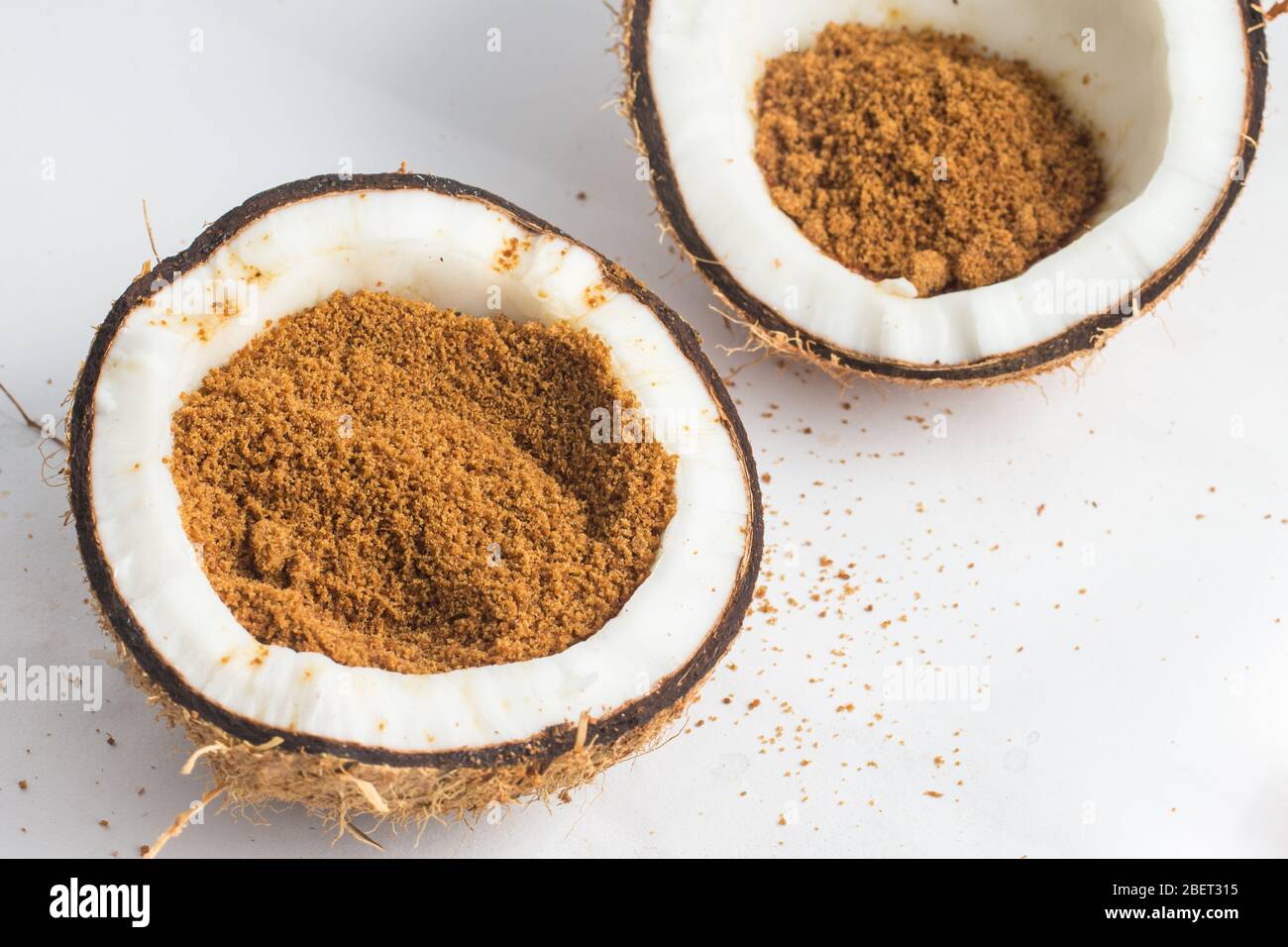 Coconut Sugar on white background. Low Glycemic Index Stock Photo - Alamy