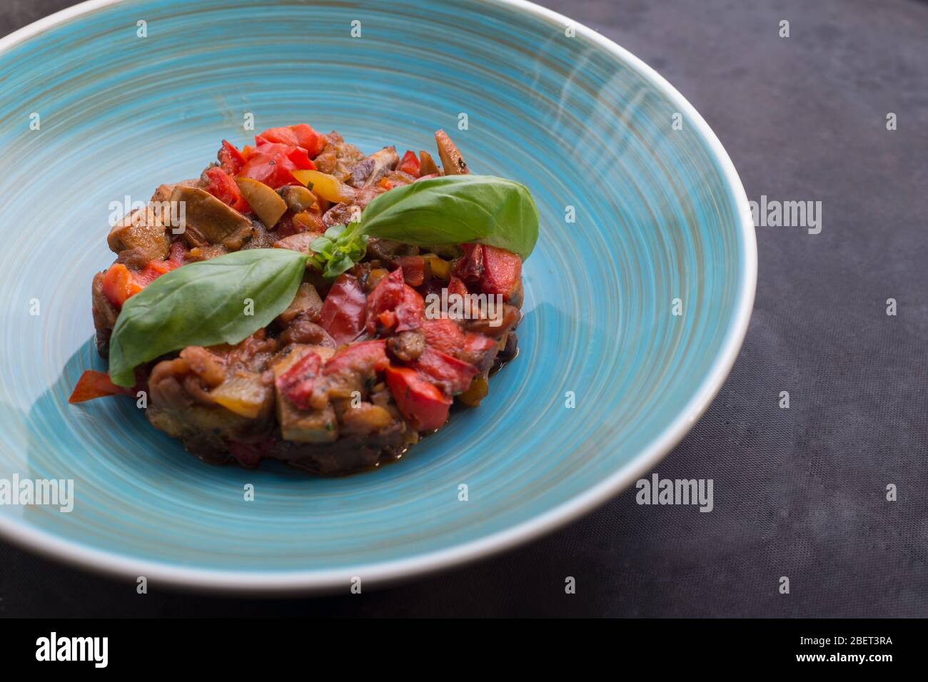 salad with vegetables and greens on wooden table Close-up top view ...