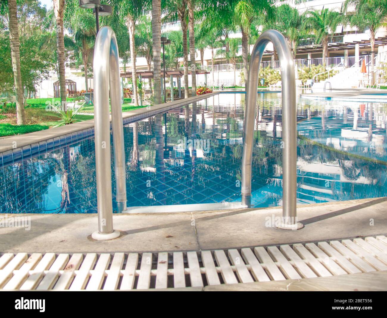 Hotel swimming pool with sunny reflections in Brazil Stock Photo - Alamy