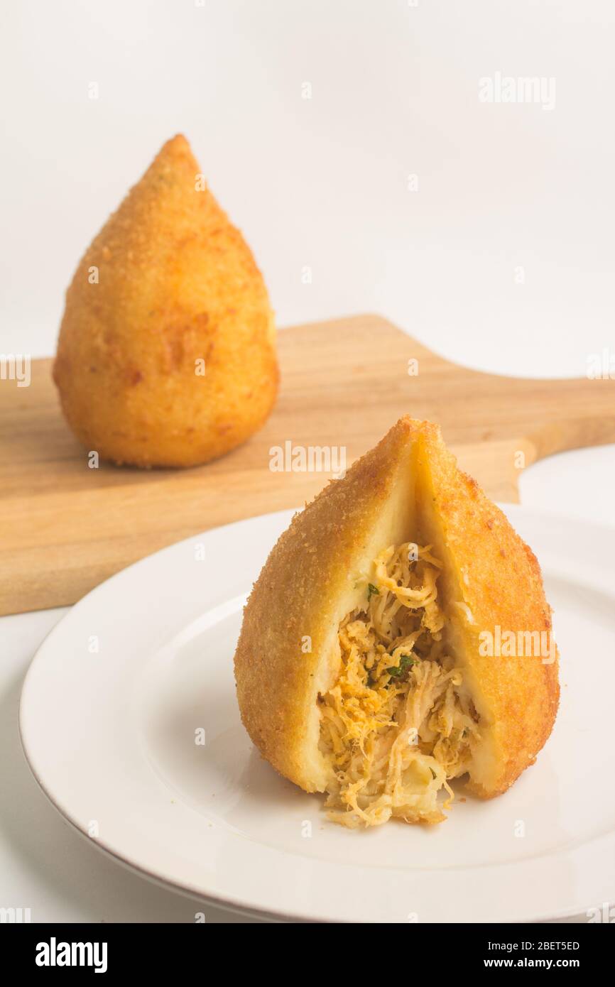 Brazilian Chicken Coxinha over a white background Stock Photo - Alamy