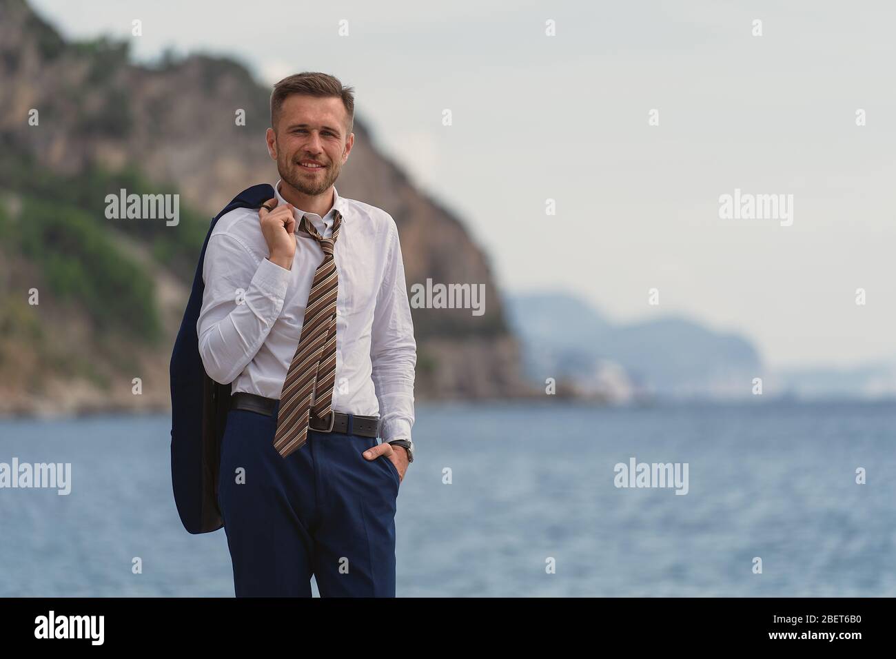 Suit and tie on the beach hi-res stock photography and images - Alamy