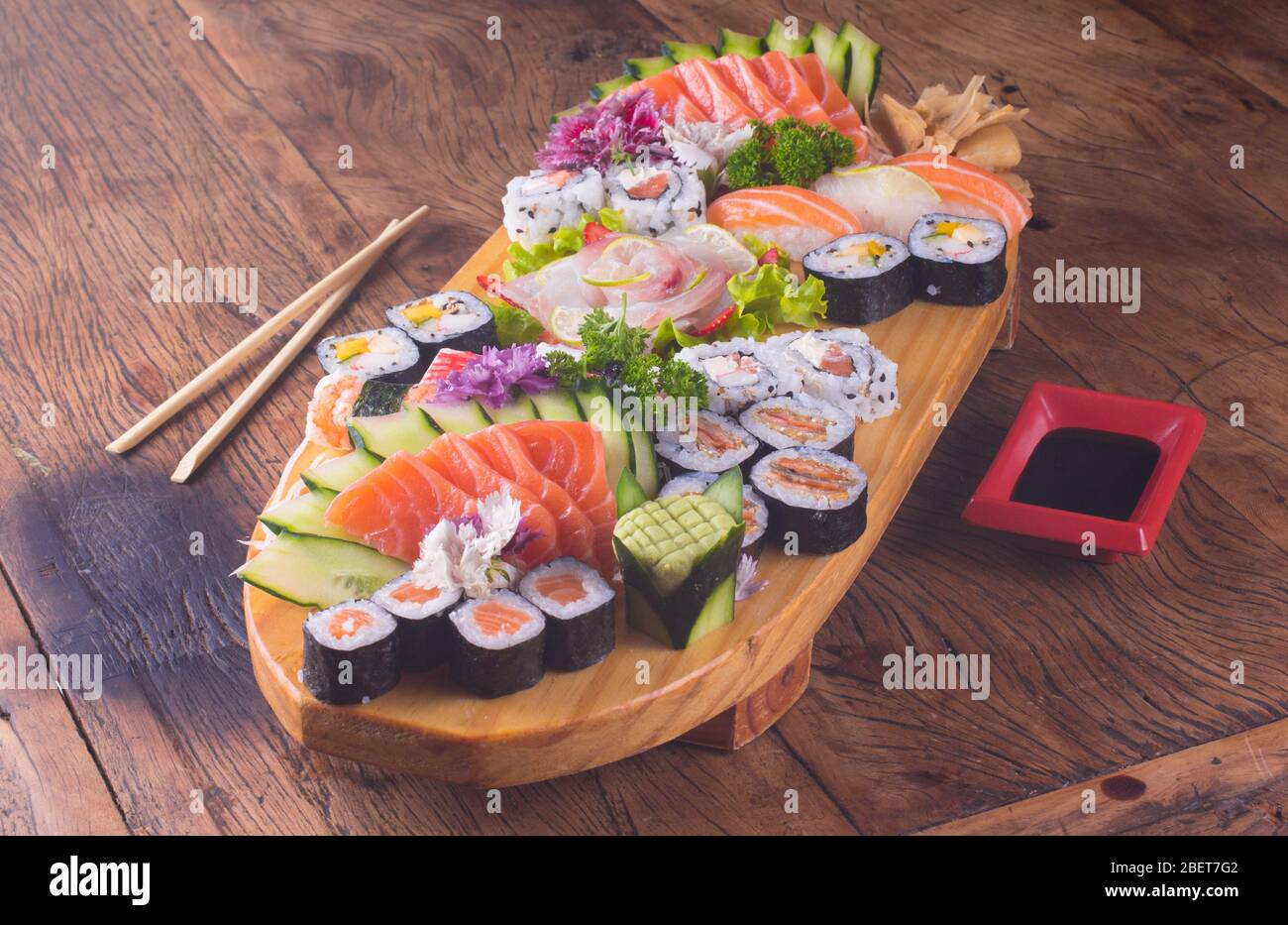 Traditional Japonese Food with sushi, sashimi and rolls Stock Photo - Alamy