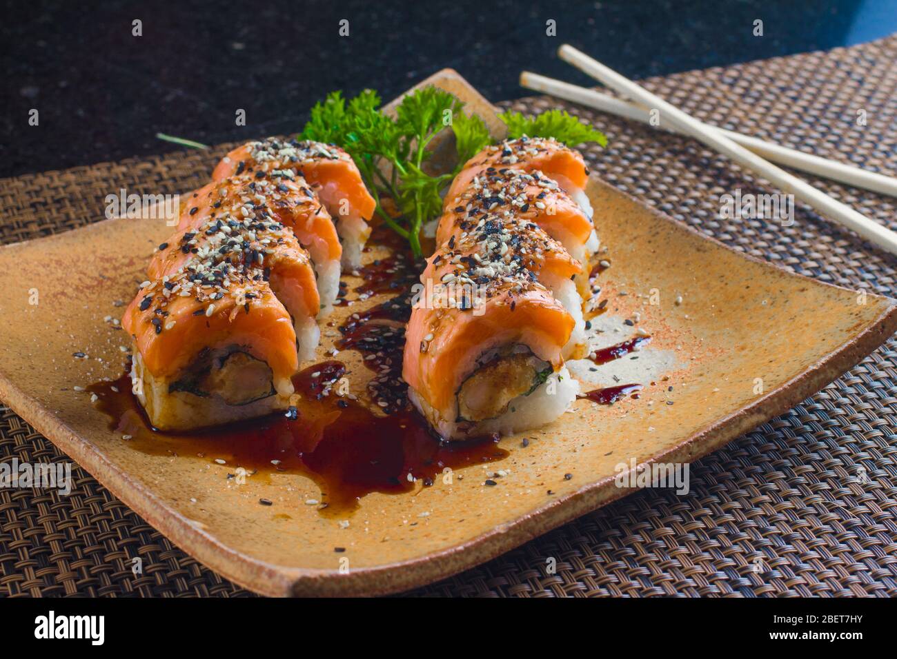 Salmon Sashimi Rolls with sesame and shoyo Stock Photo - Alamy