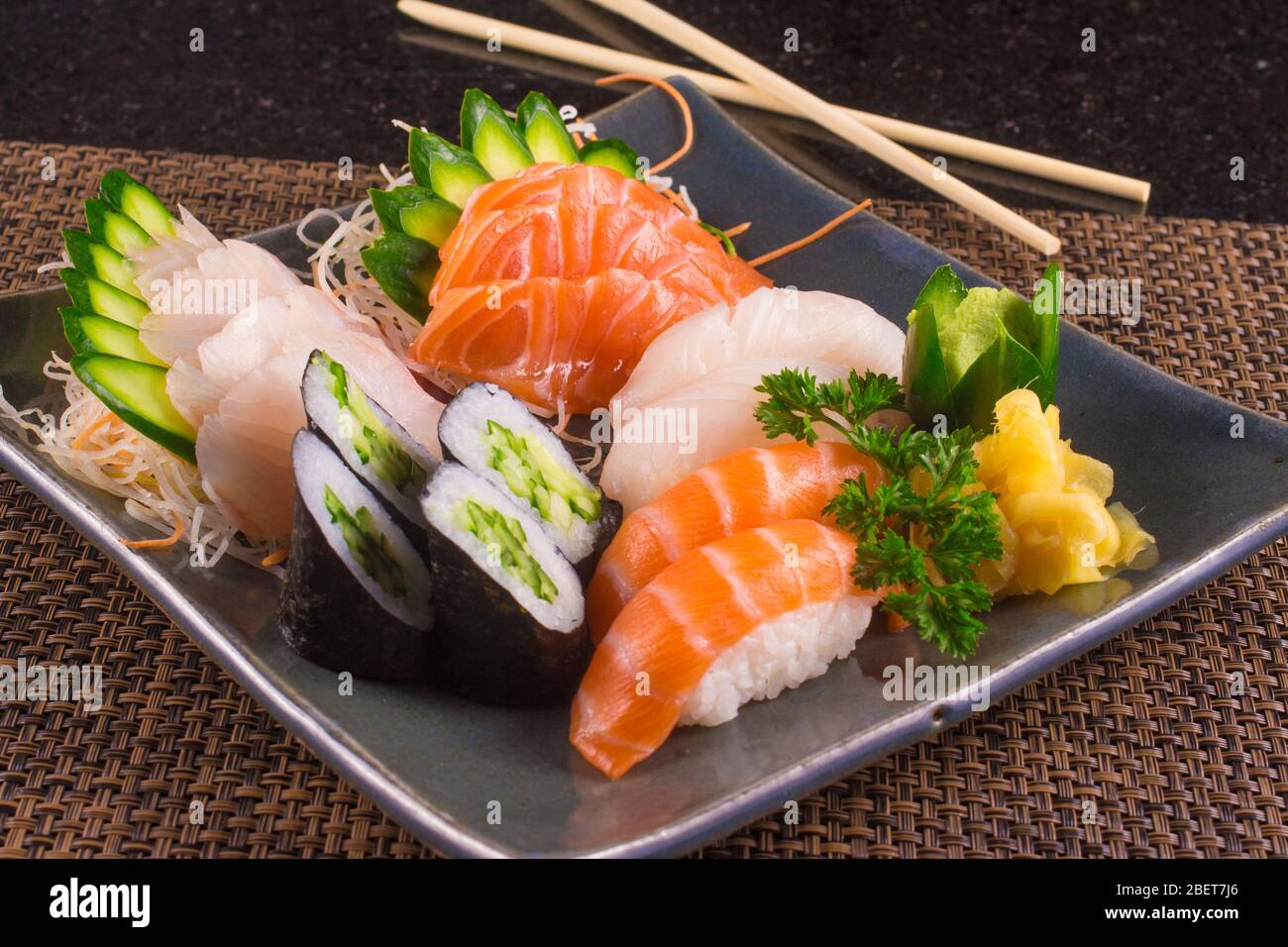 Traditional Japonese Food with sushi, sashimi and rolls Stock Photo - Alamy