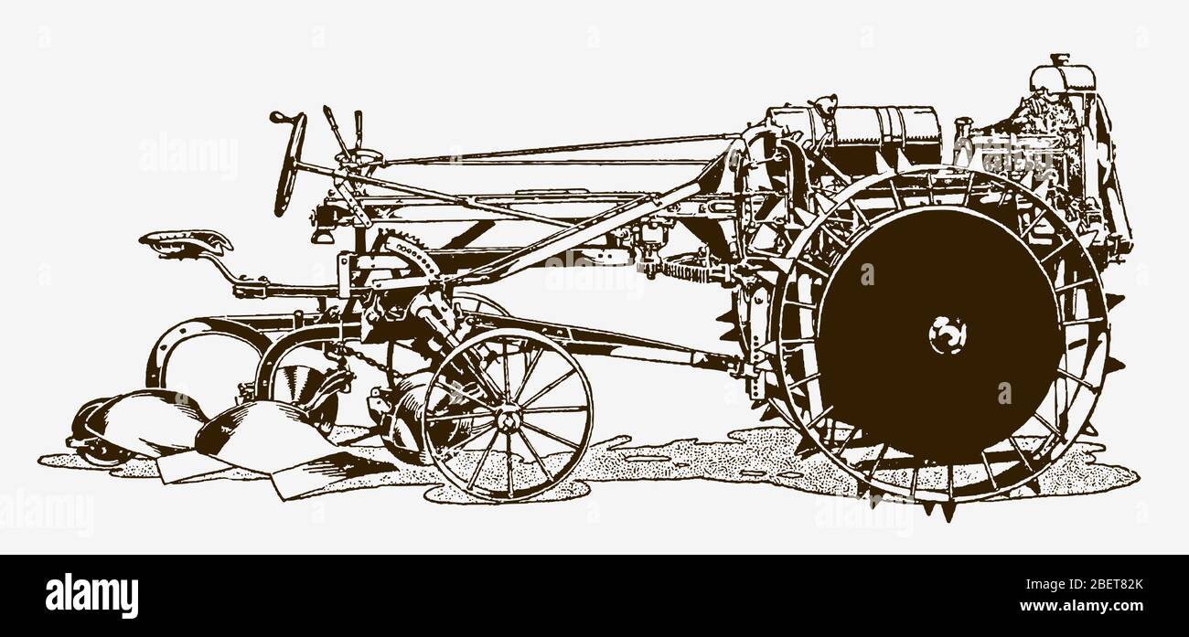 Historical two-wheel tractor with an attached plow in side view ...