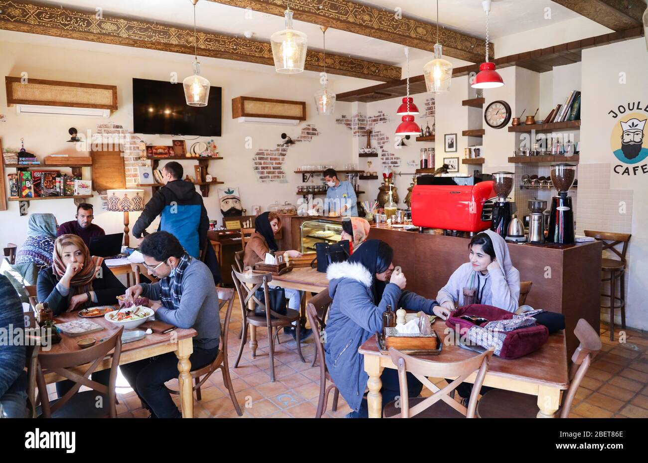 Persian men table hi-res stock photography and images - Alamy