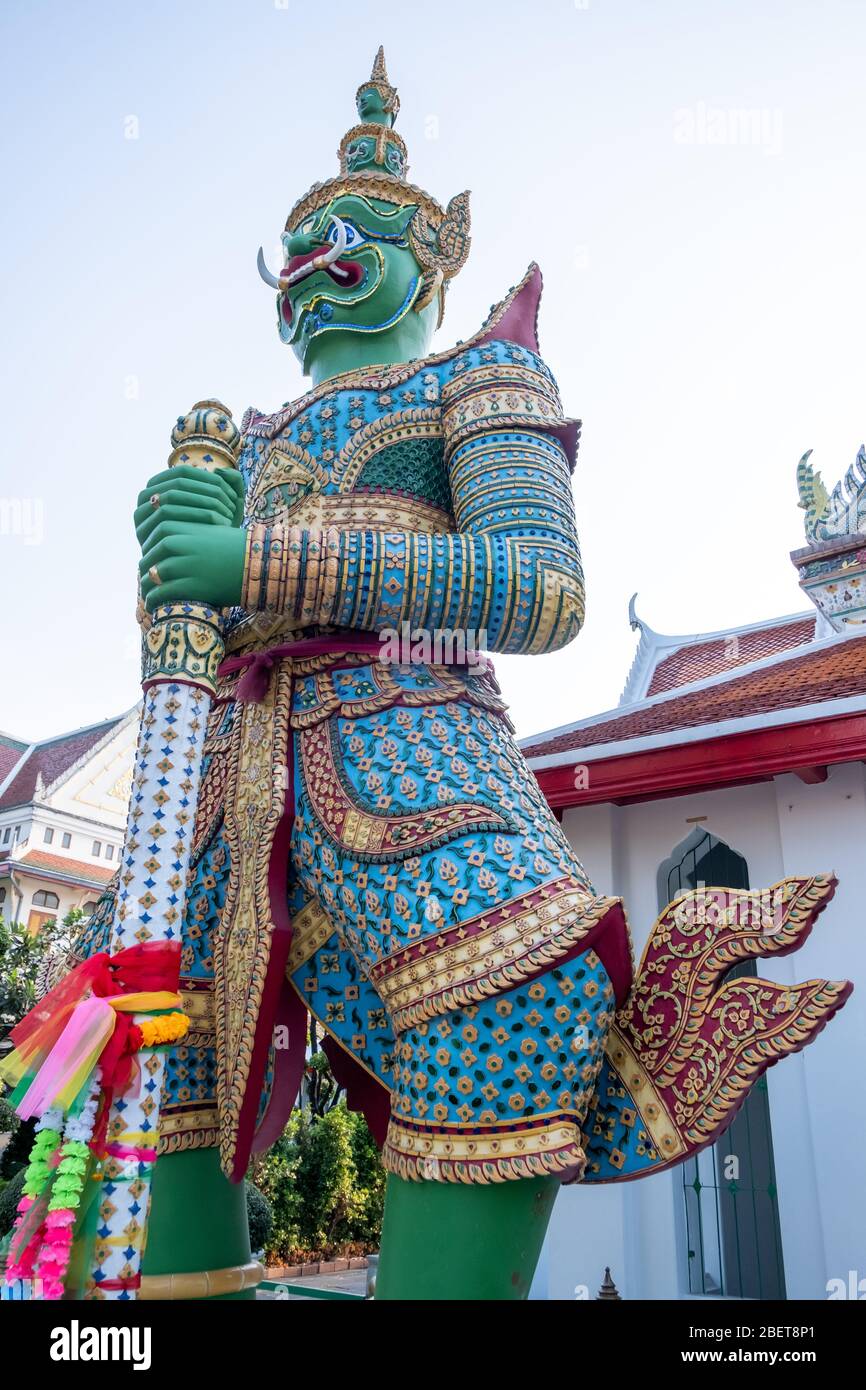Statue of Giant at Wat Arun. Wat Arun or Temple of the Dawn is one of a ...