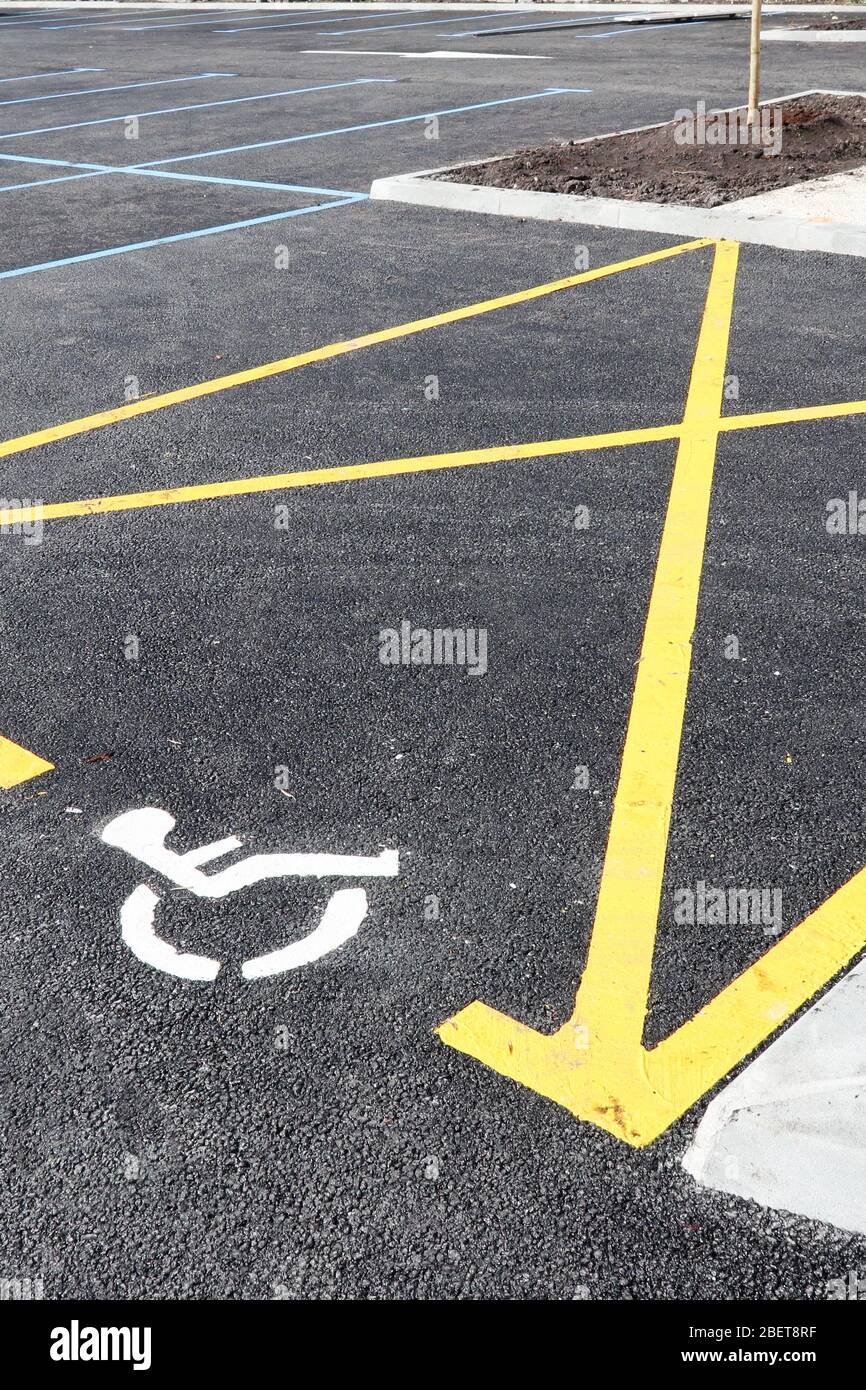 Wheel chair symbol in disabled parking permit sign painted Stock Photo ...