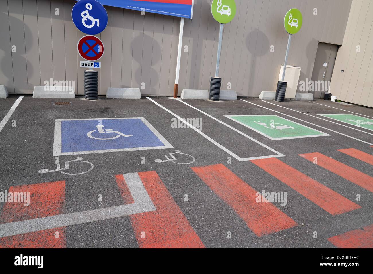Handicapped parking car only electric vehicle ve pictogram on street ...