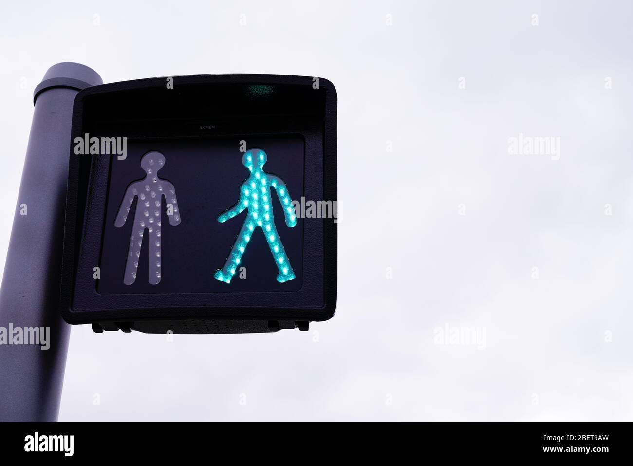 green traffic light signaling pedestrian crossing Stock Photo - Alamy