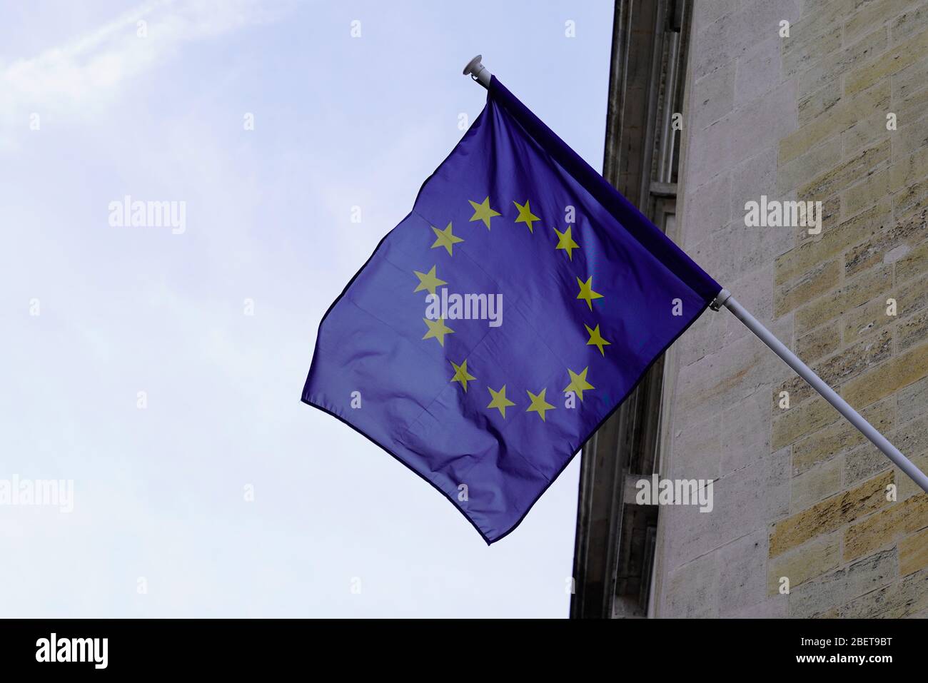 eu Flag of European Union waving in wind on flagpole building against ...