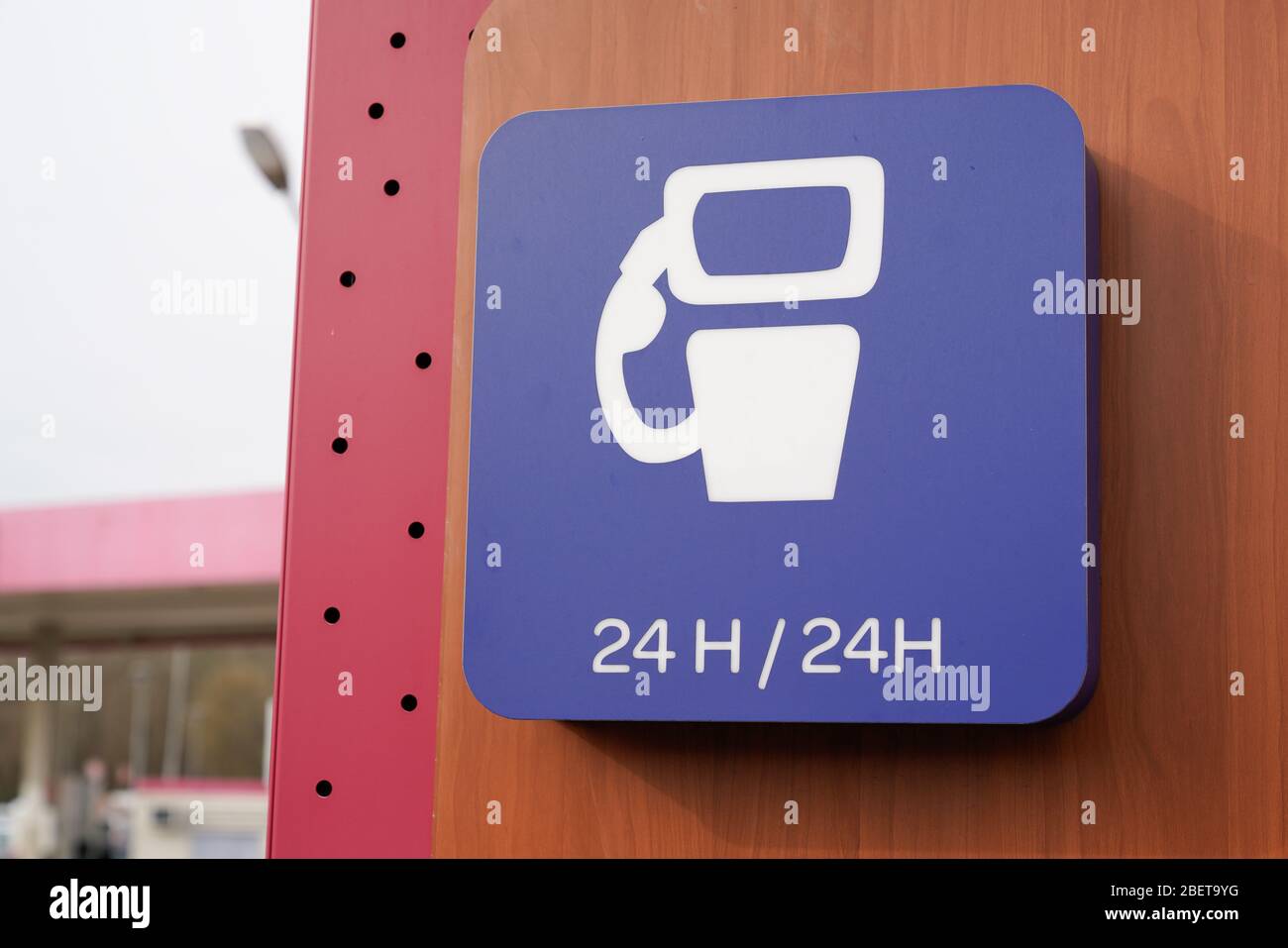 gas station sign 24 Open hrs hours Stock Photo - Alamy